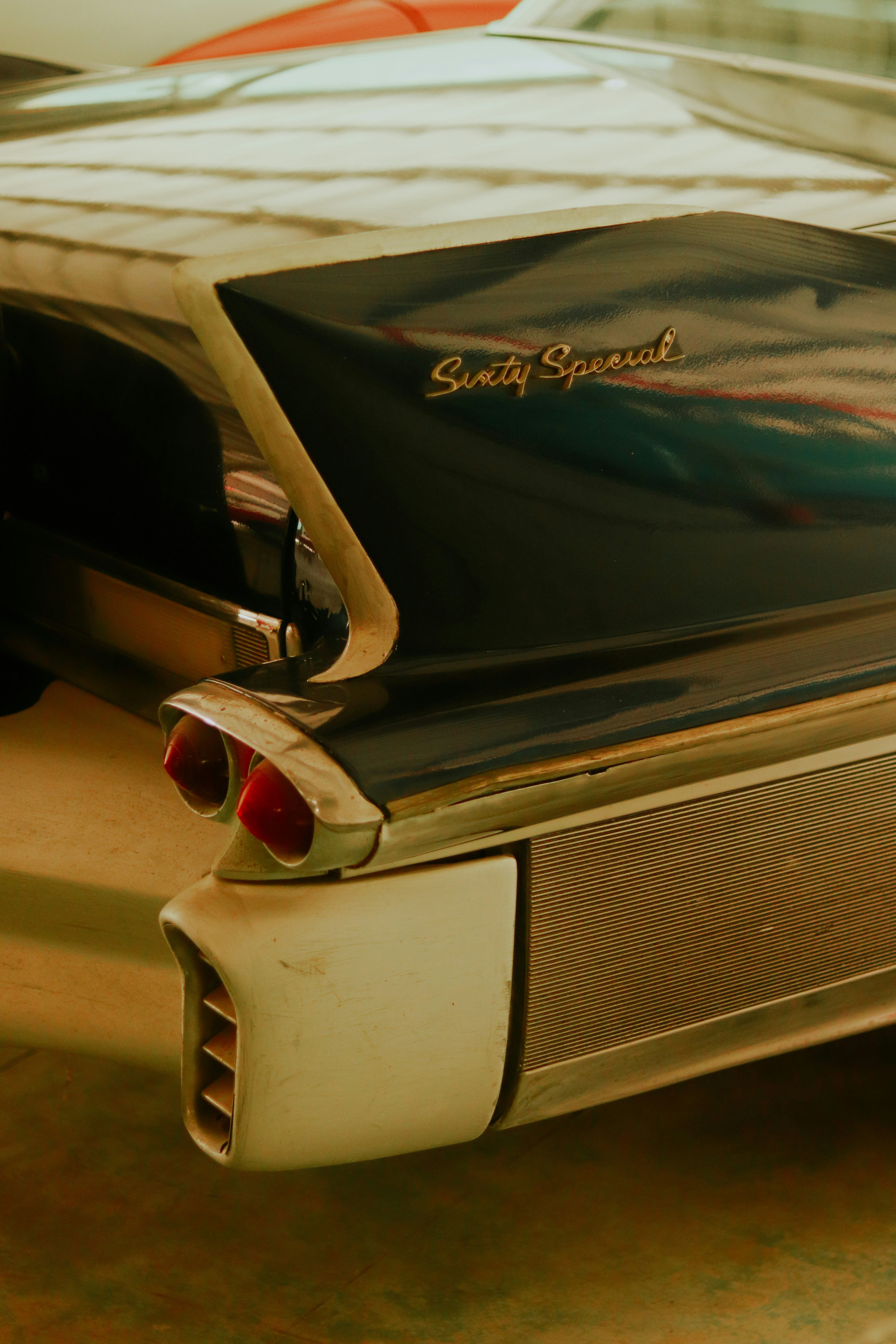 Cadillac Sixty Special Tailfin: Echoes of Chrome in Sunset Hue
