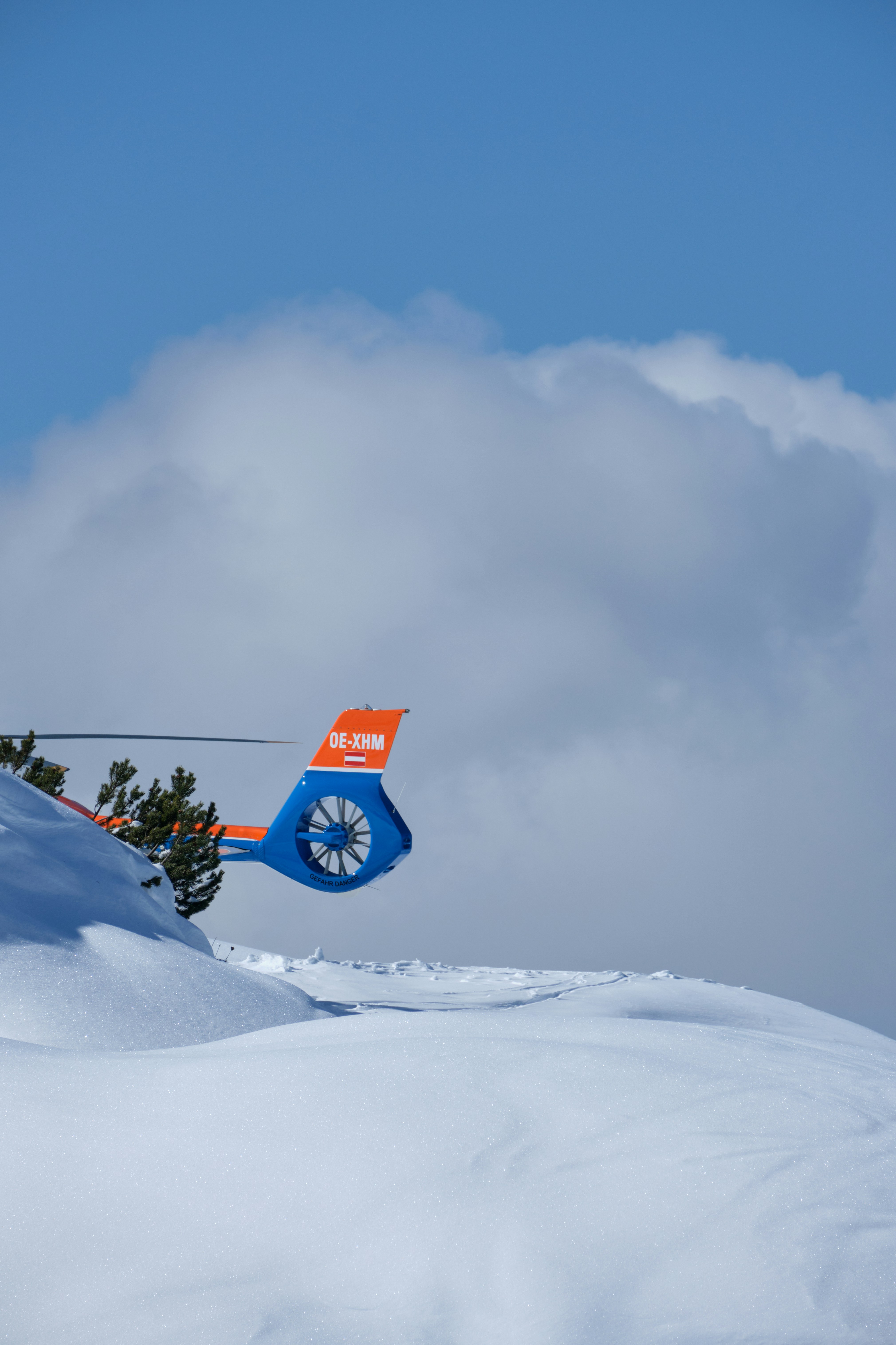 Rescue helicopter in the Austrian Mountains