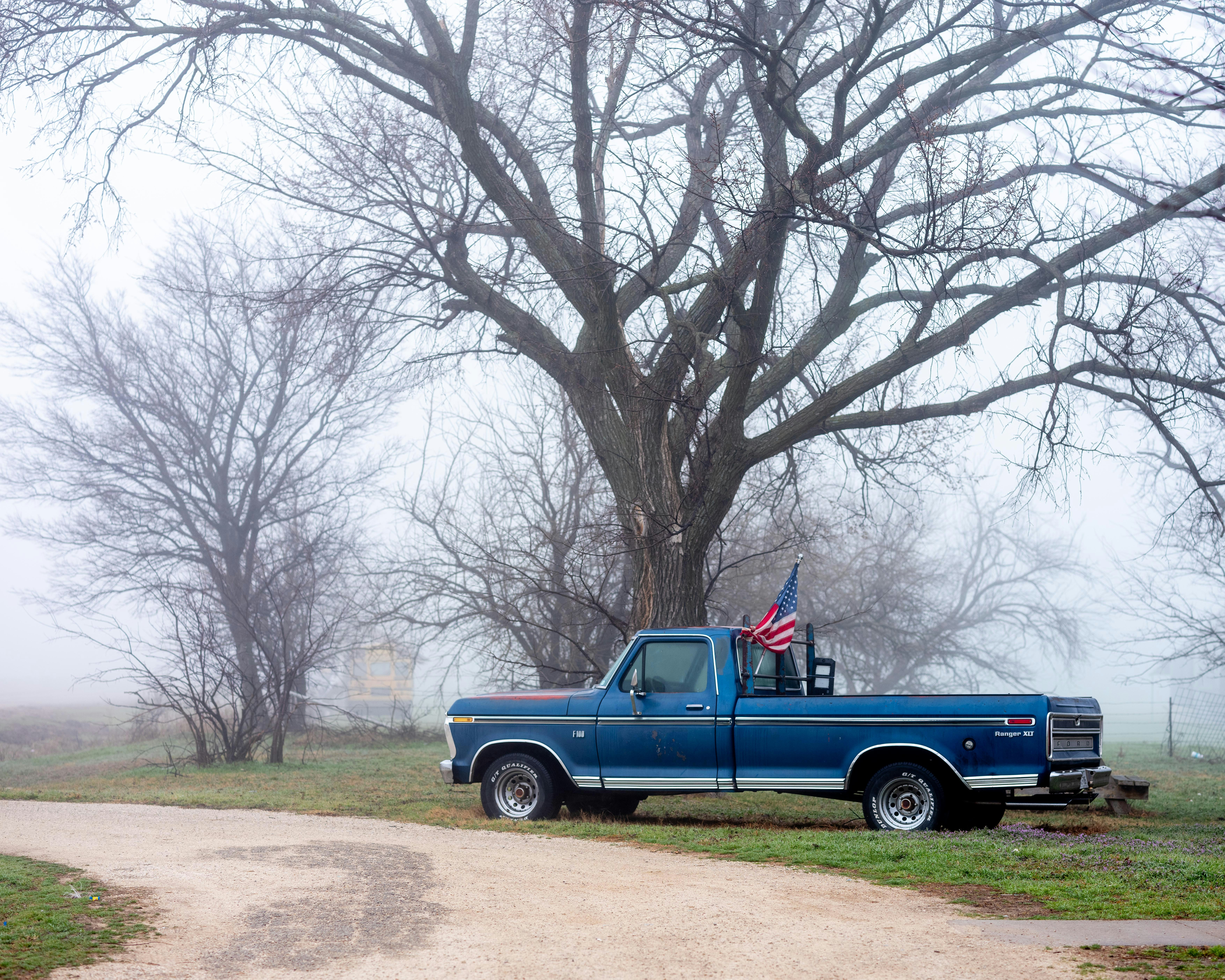 Misty Morning with a Classic Blue Pickup