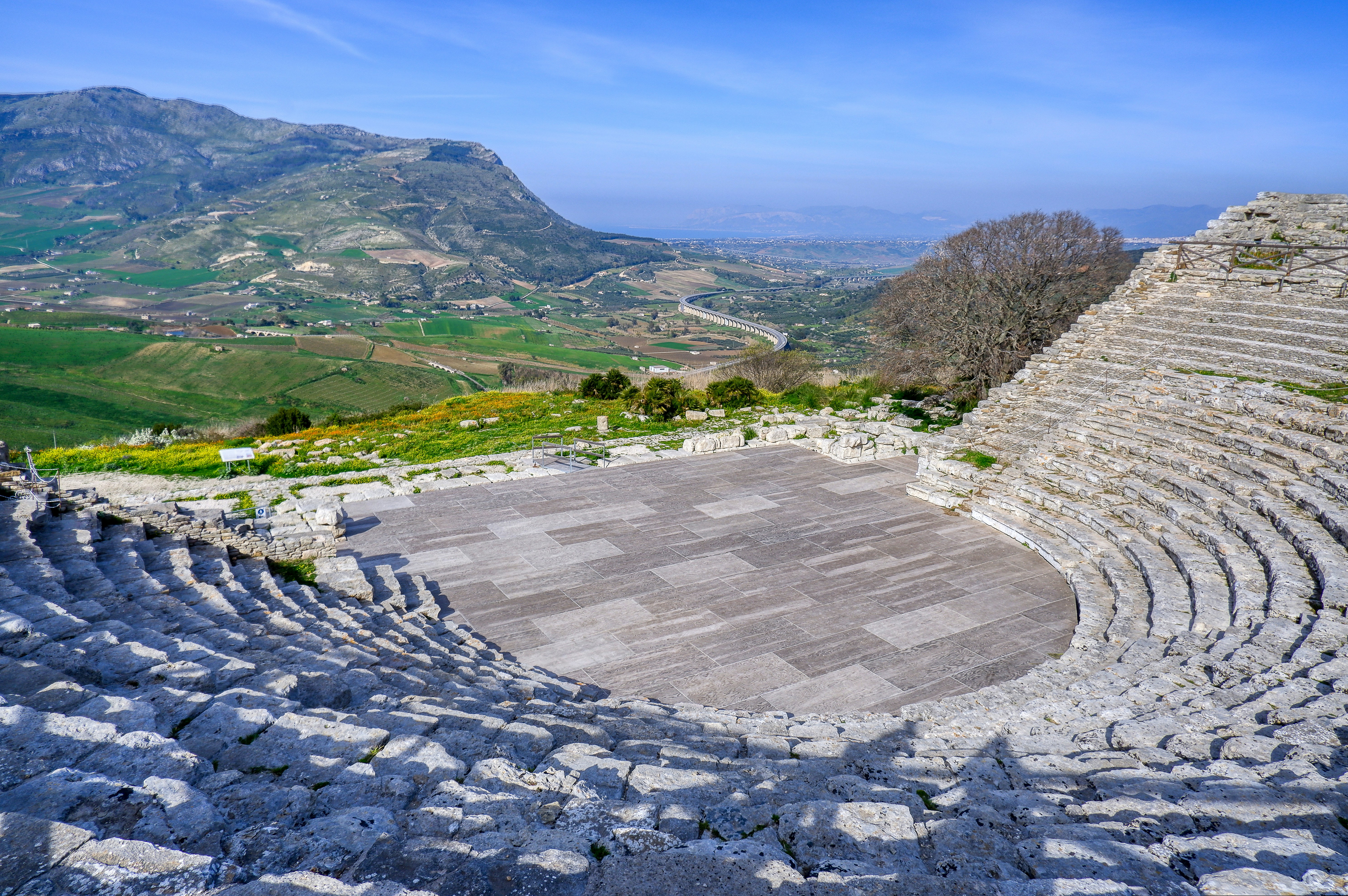 A stone amphit with a view of a valley photo – Free Teatro di segesta ...