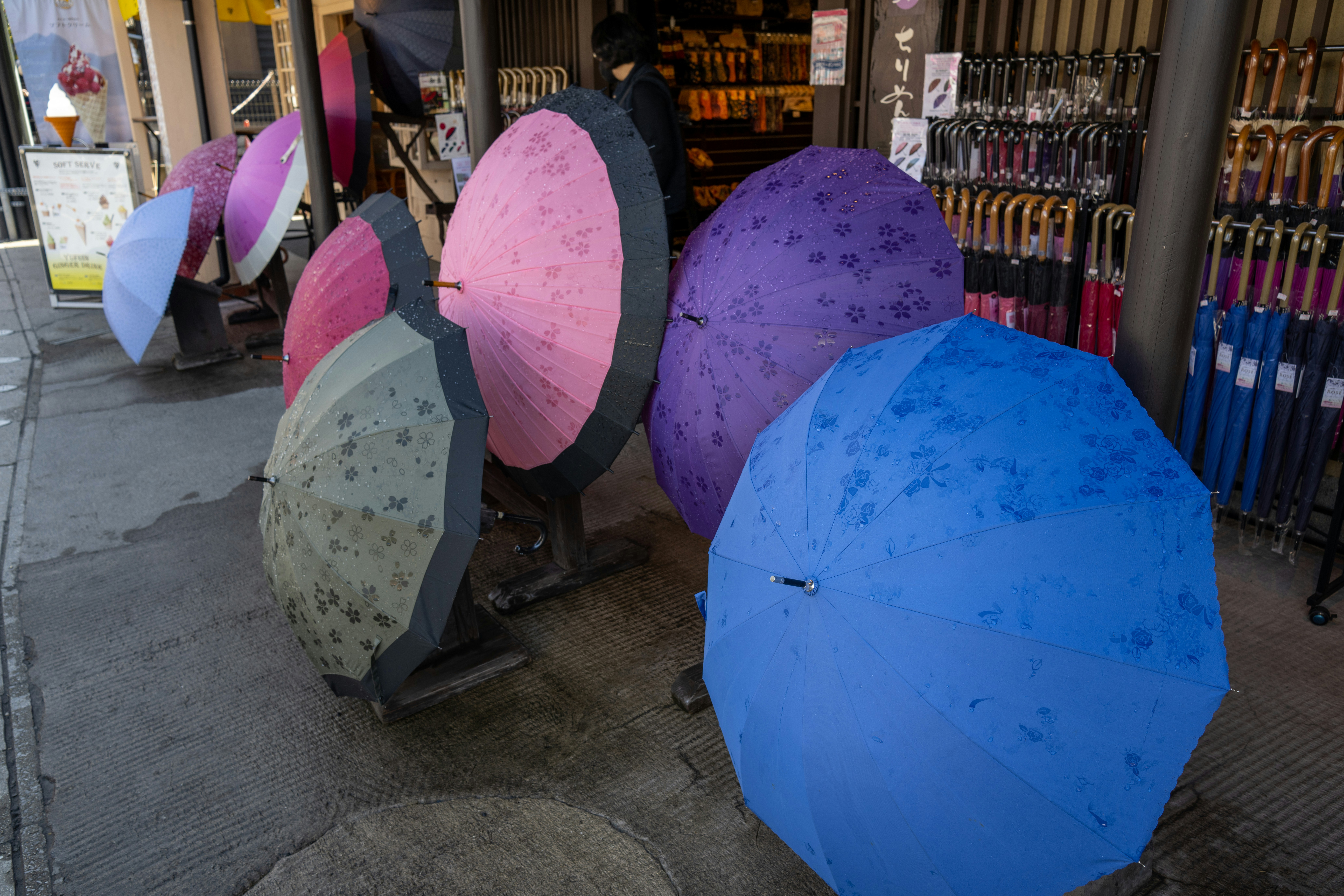 a bunch of umbrellas that are on the ground