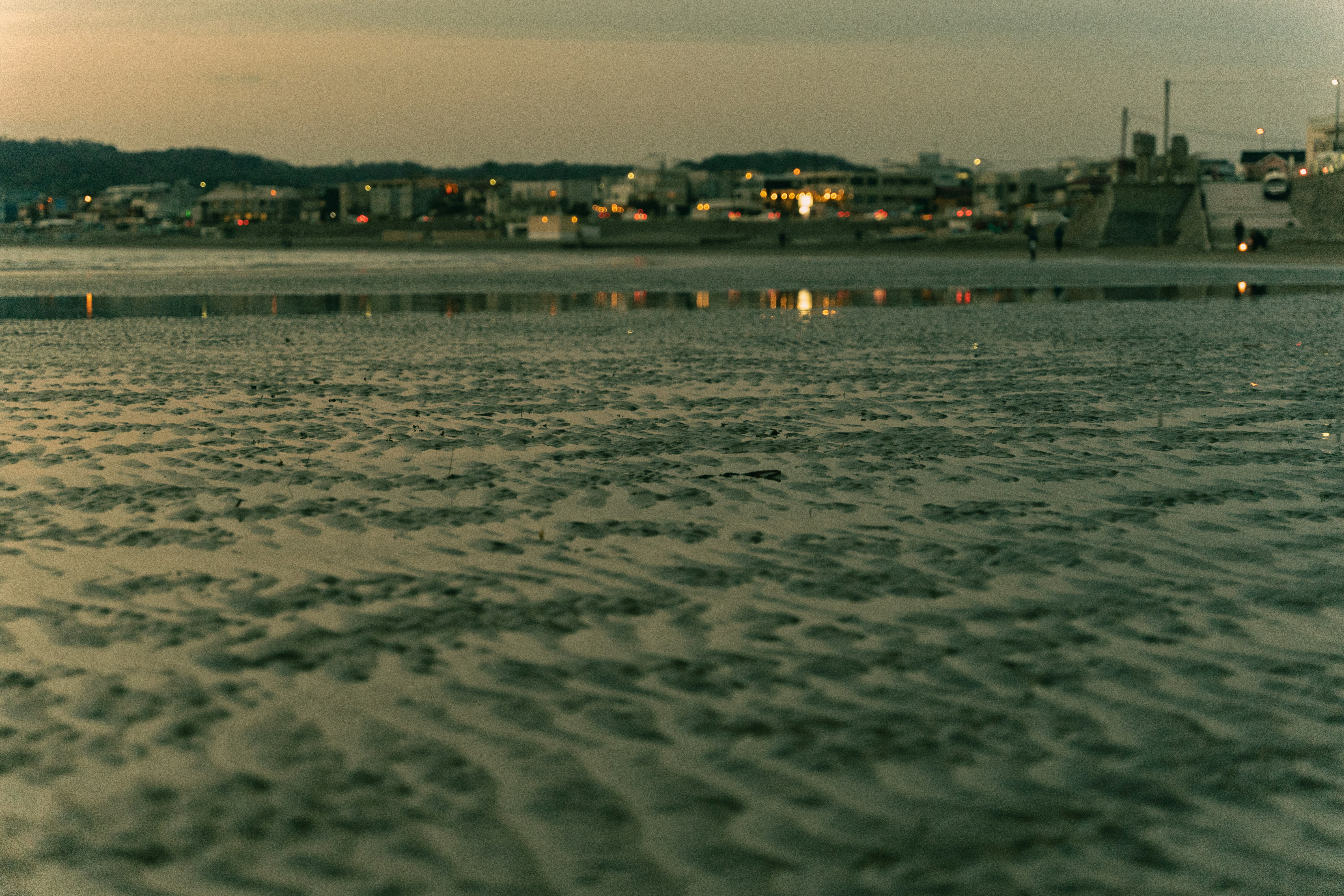 Ripples to Harbor Lights: Golden Hour on a Quiet Shore