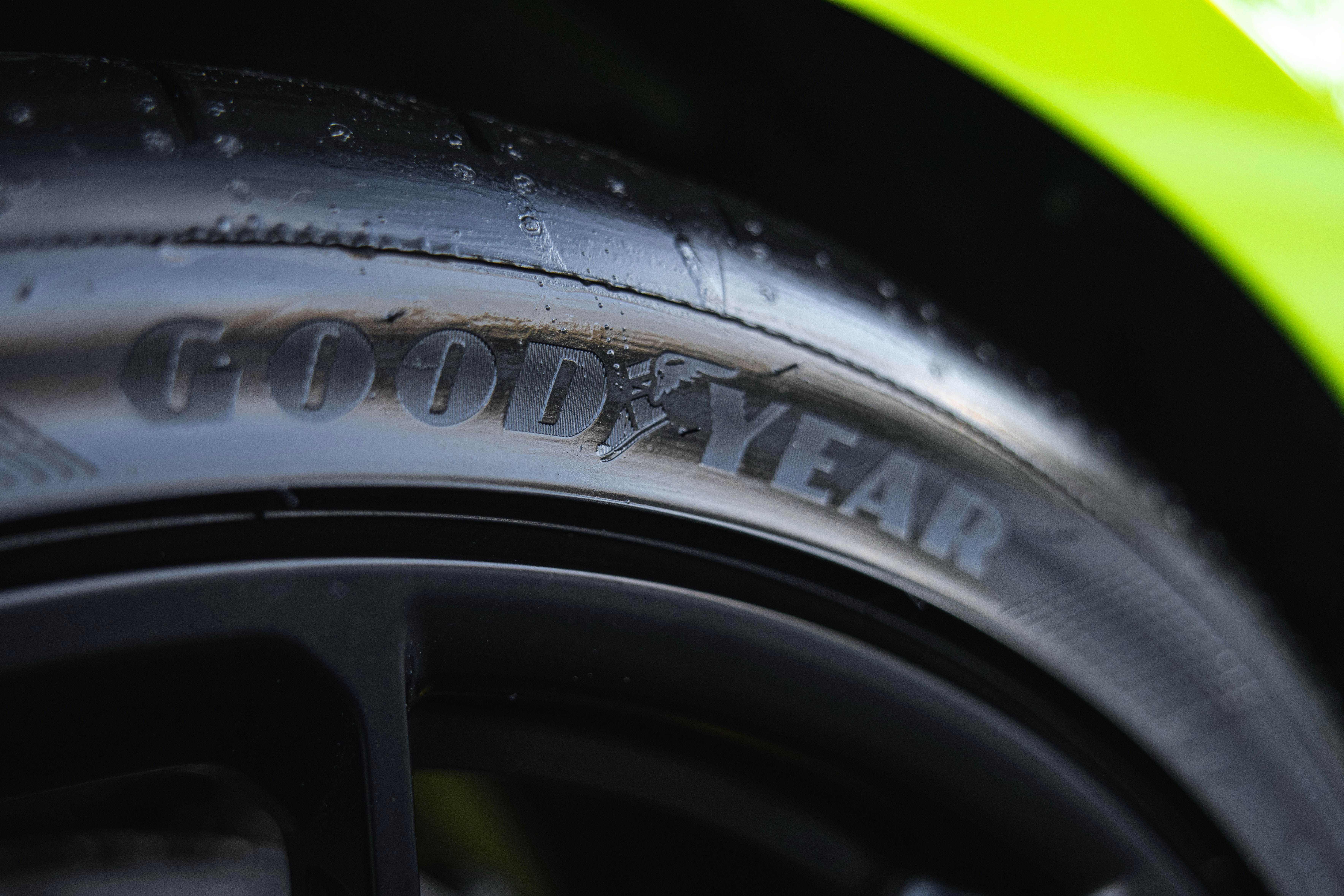 A close up of a tire on a car photo – Free Alloy wheel Image on Unsplash