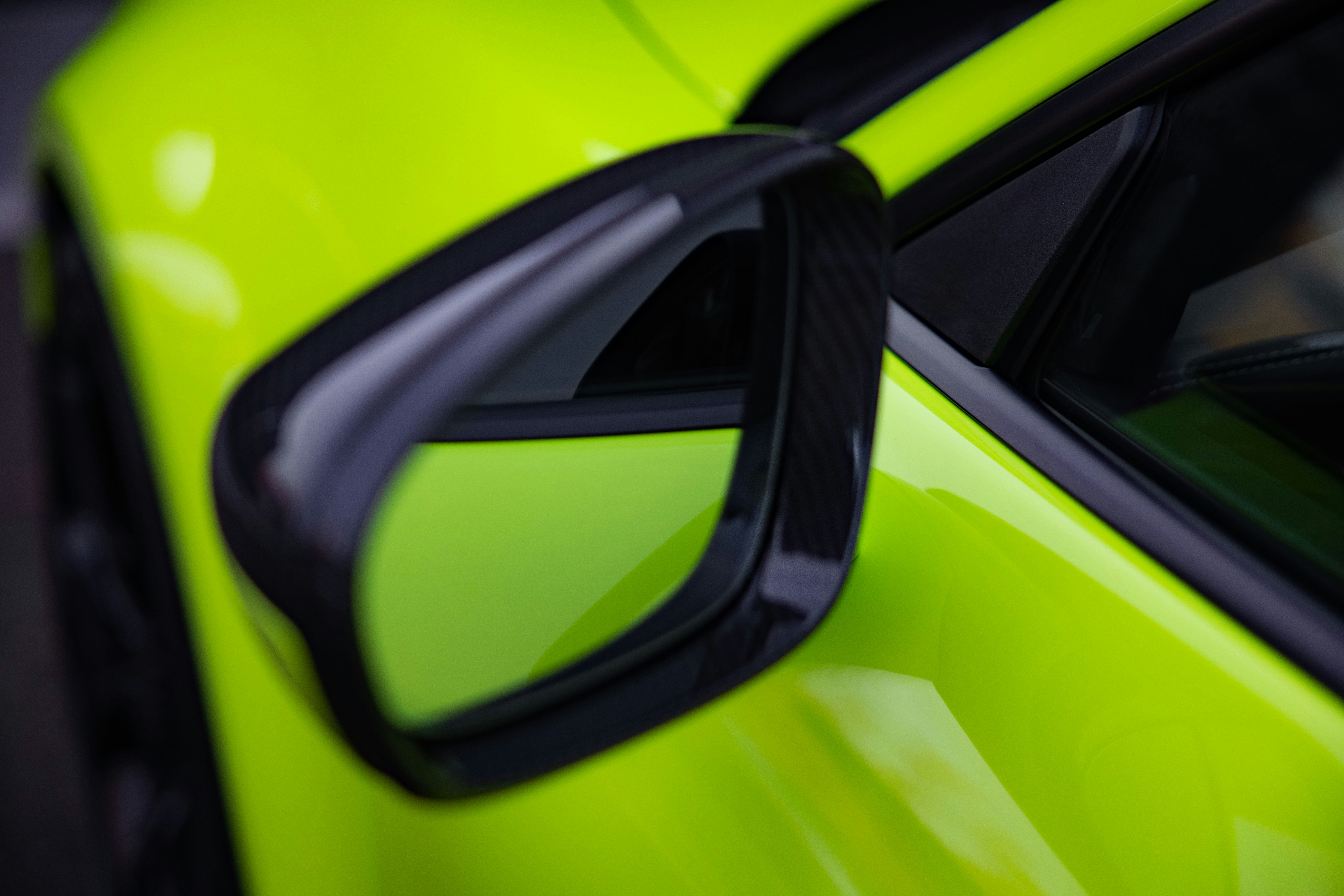 a close up of a car's side view mirror