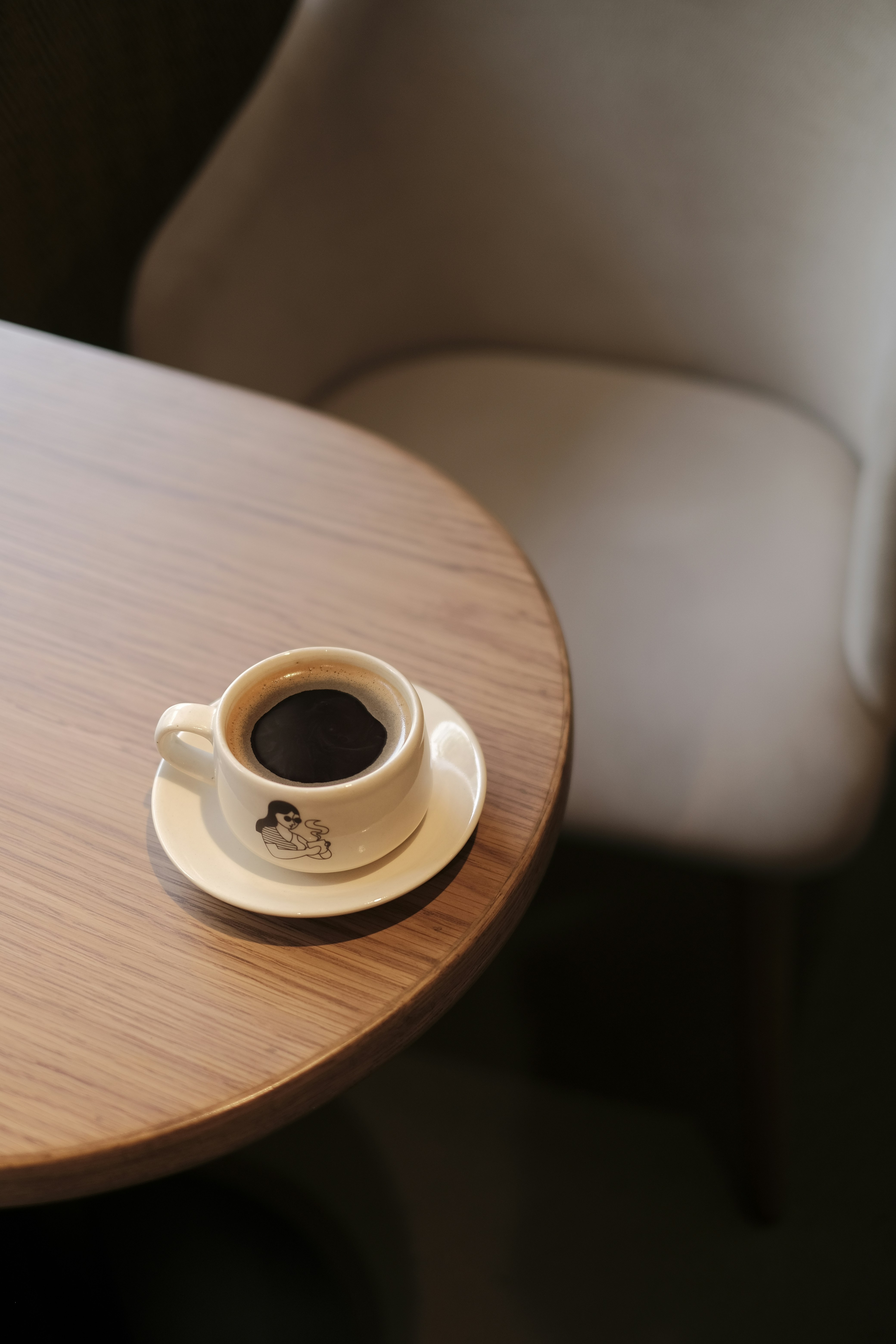 Round Table Espresso: Steam Curling Over Warm Wood