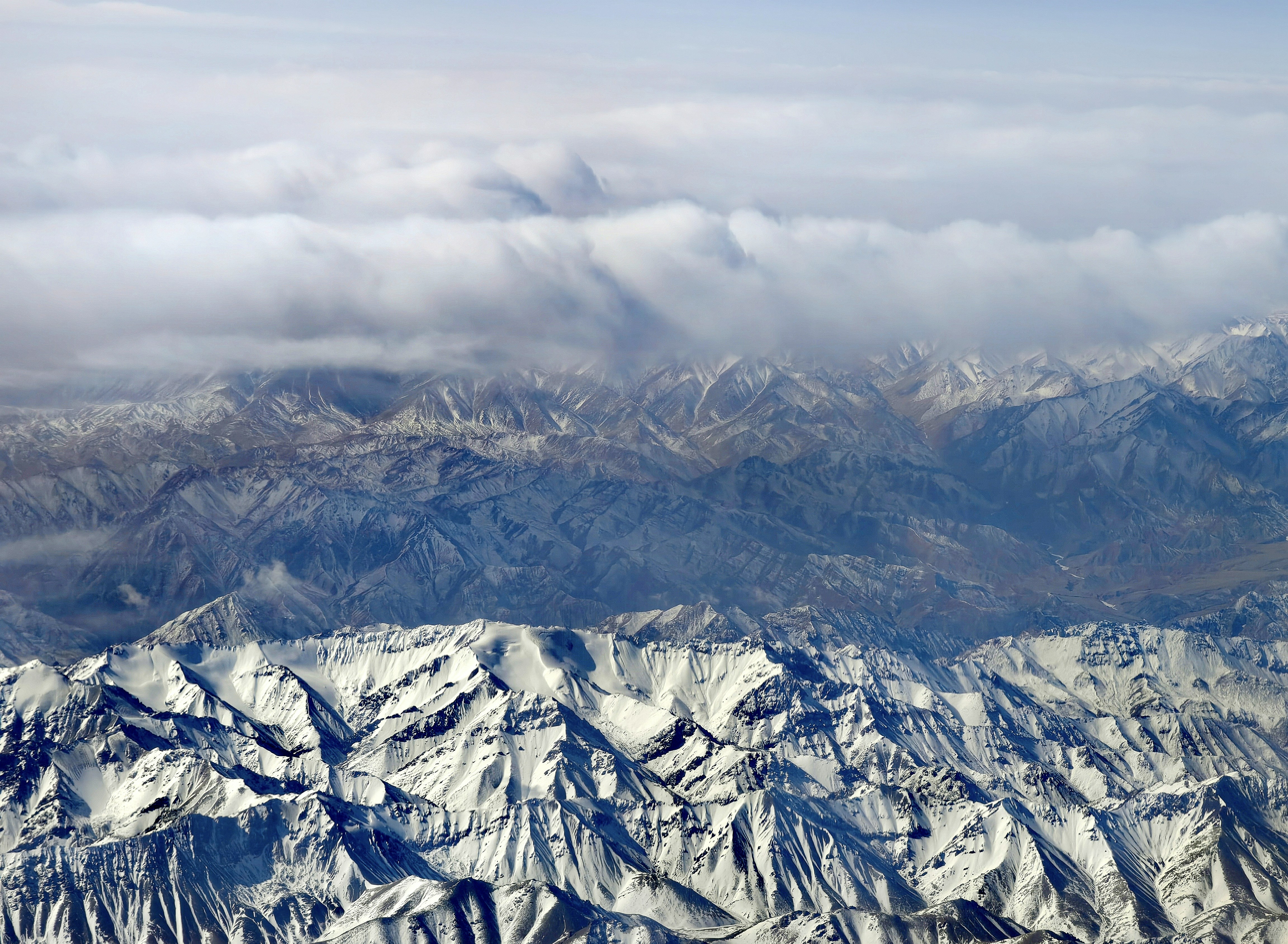 A view of a mountain range from an airplane photo – Free Sunan yugur ...