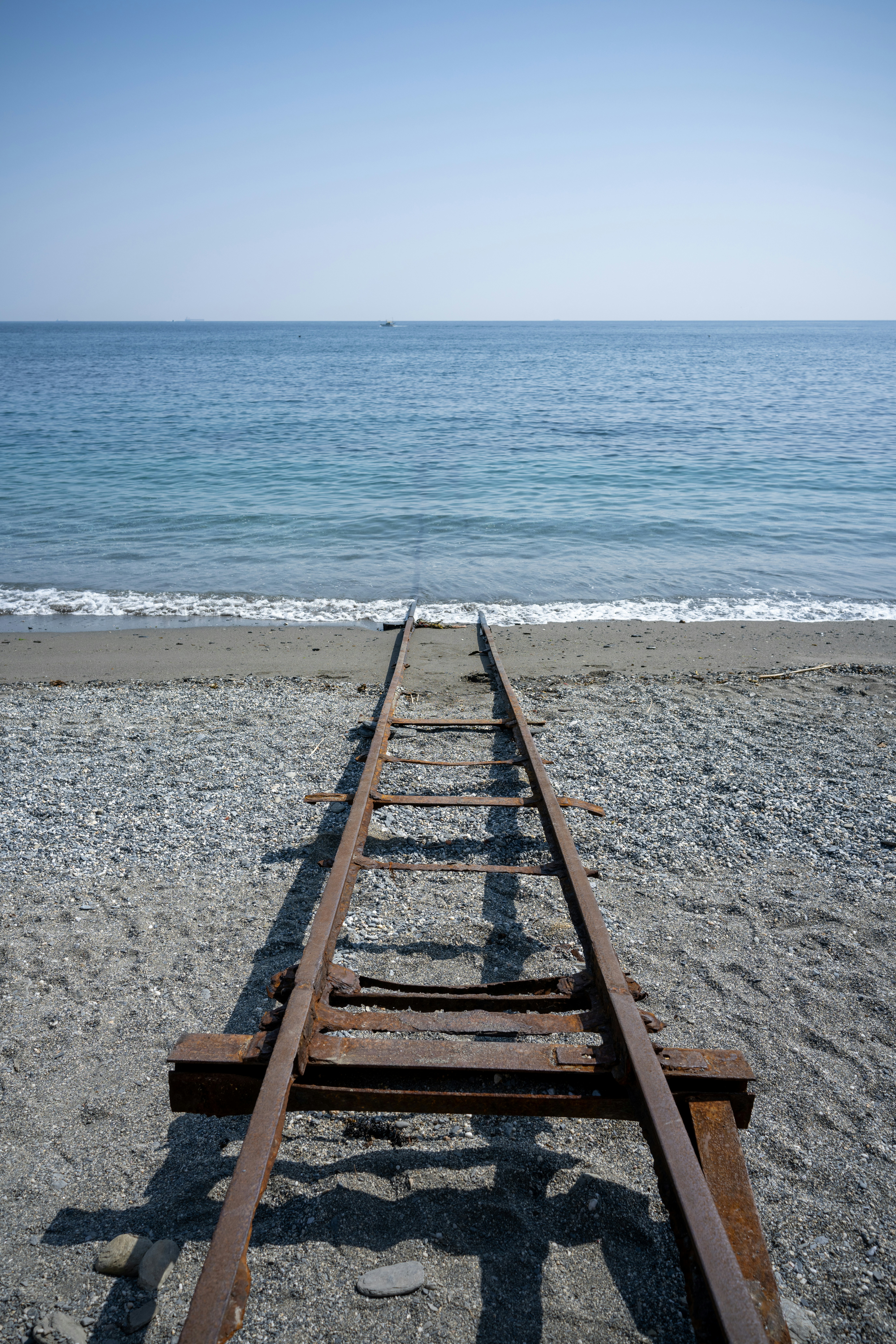 Rusted Rails to the Sea: A Silent Path to the Horizon