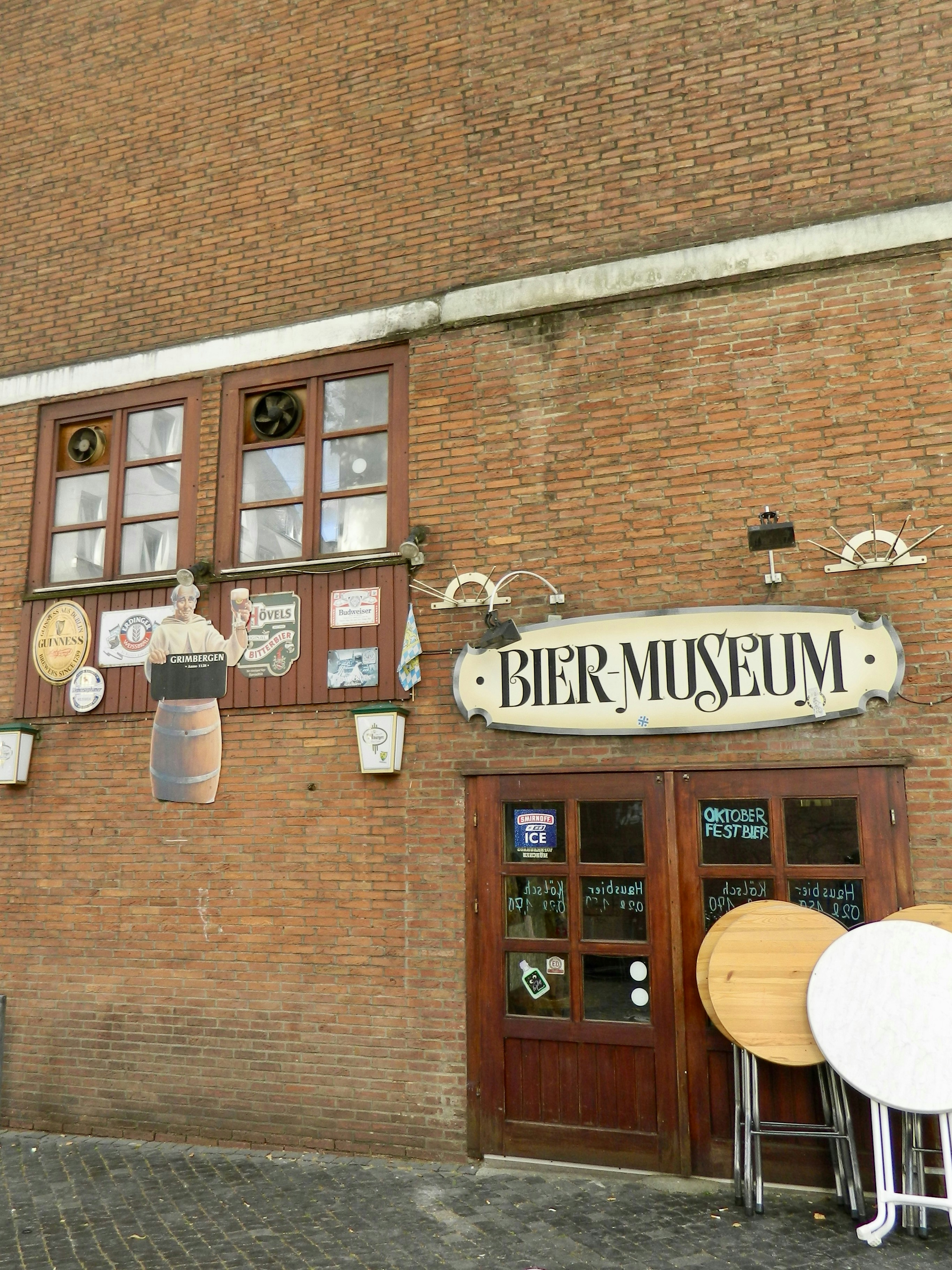 A brick building with a sign that says beer museum photo – Free Köln ...