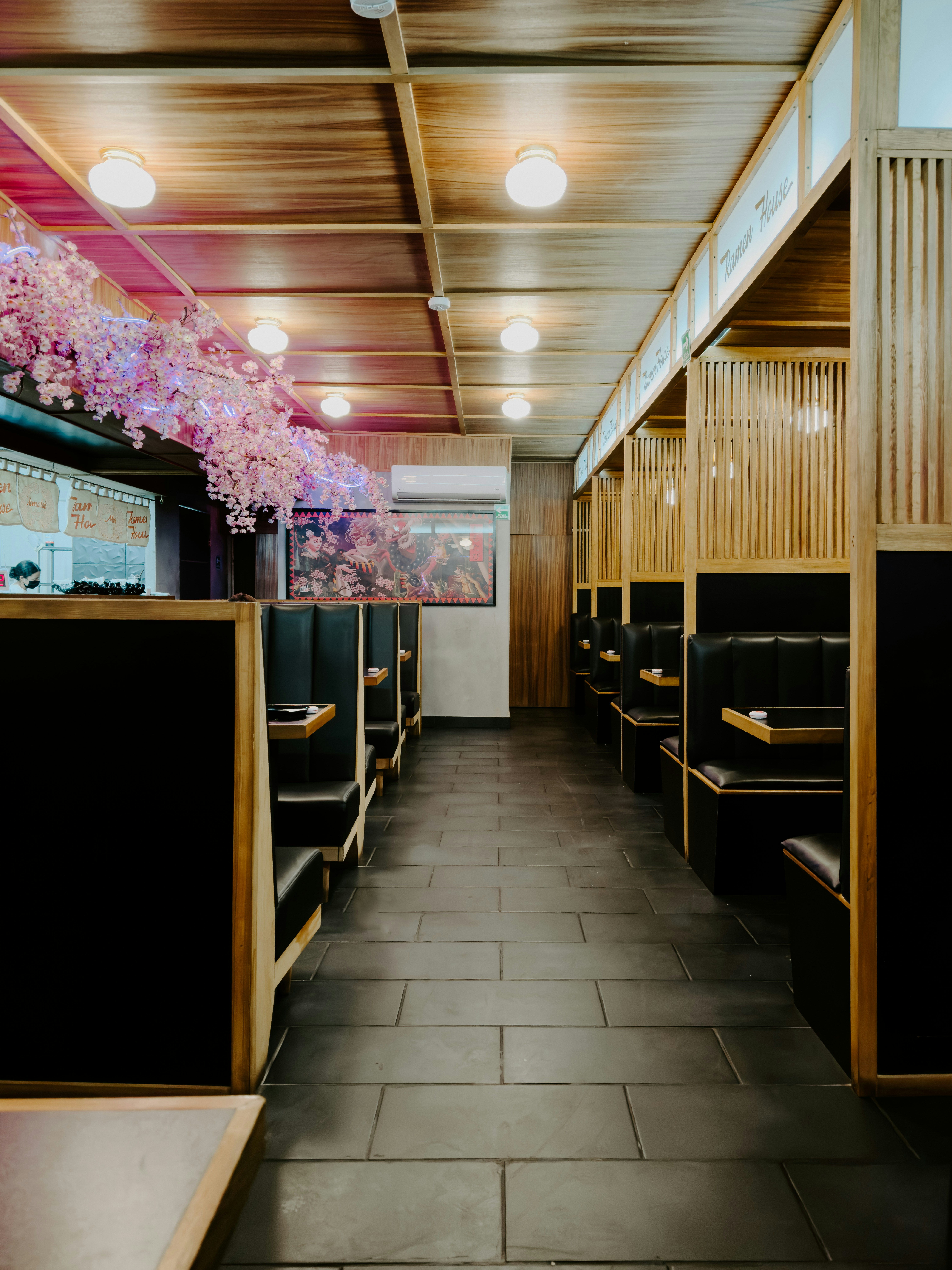 A restaurant with a long row of booths photo – Free Interior design ...