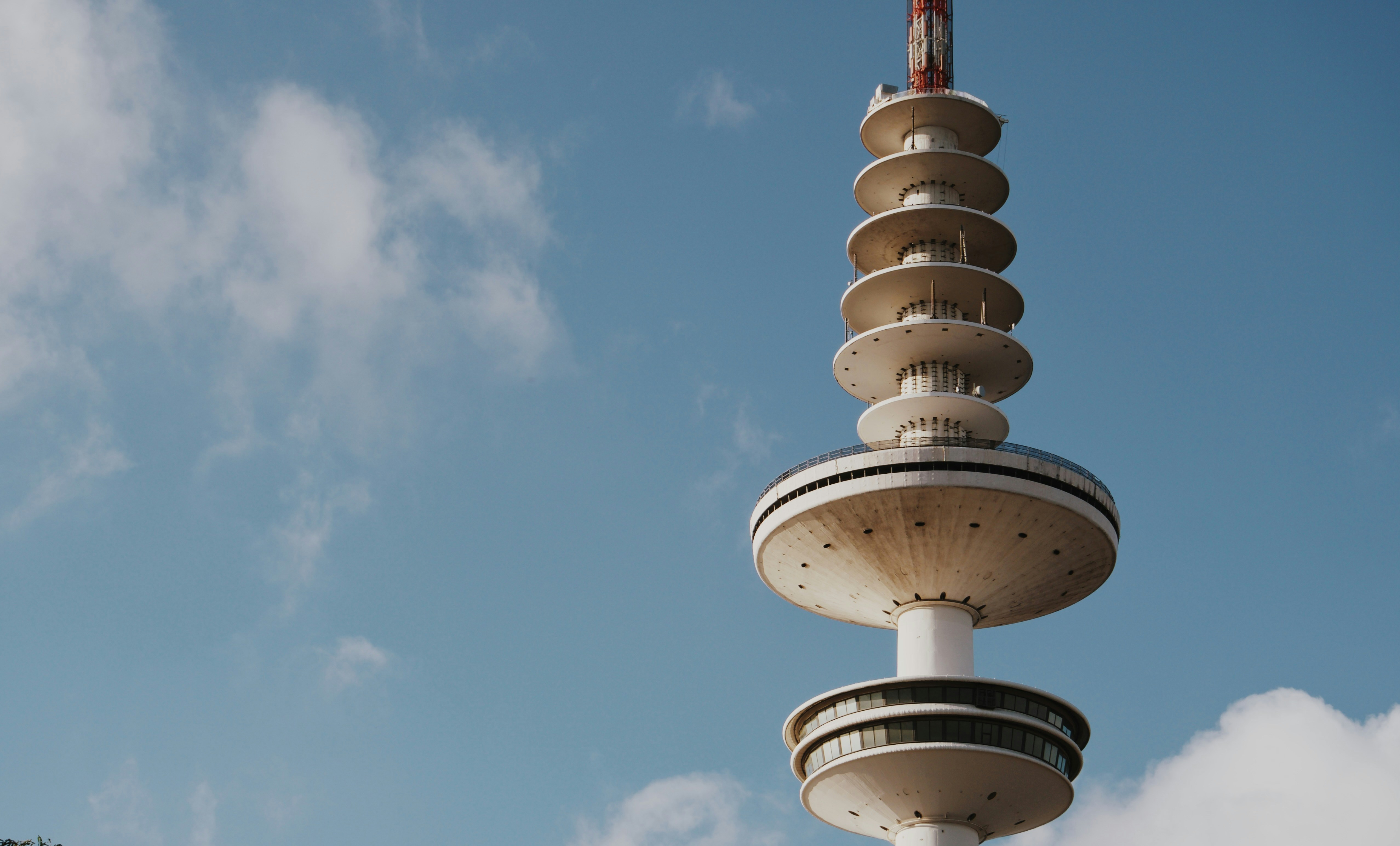 A tall tower with a clock on top of it photo – Free City Image on Unsplash