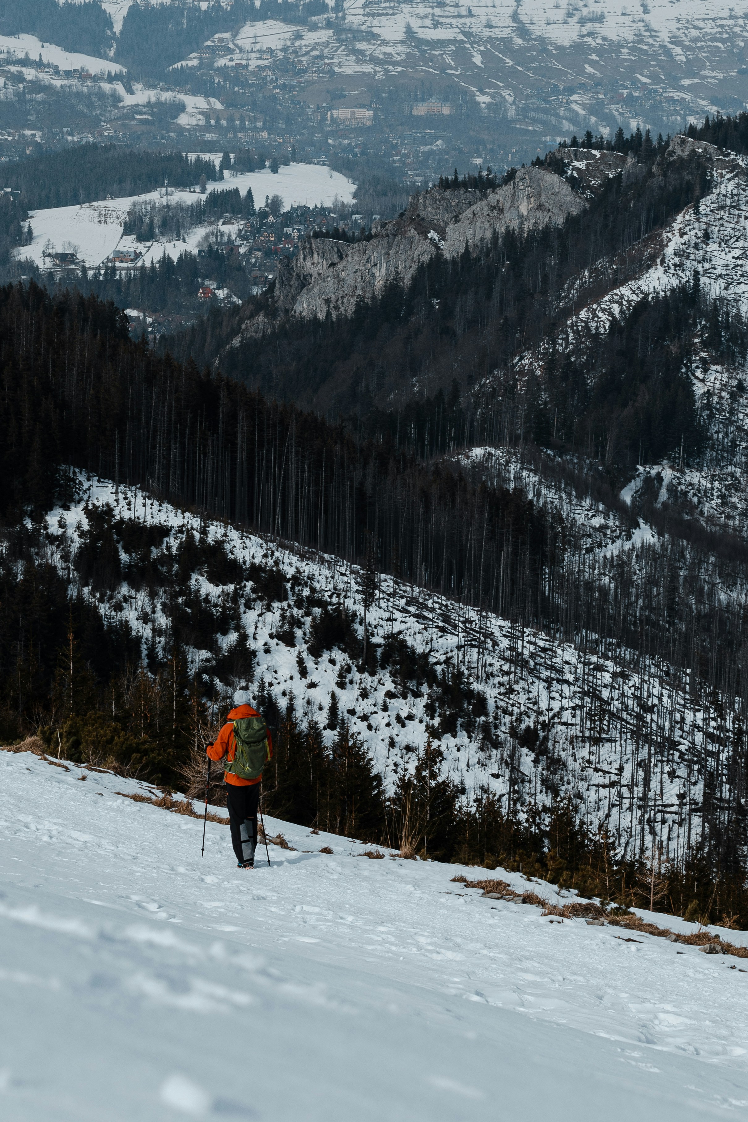 tourist walking along a snowy path