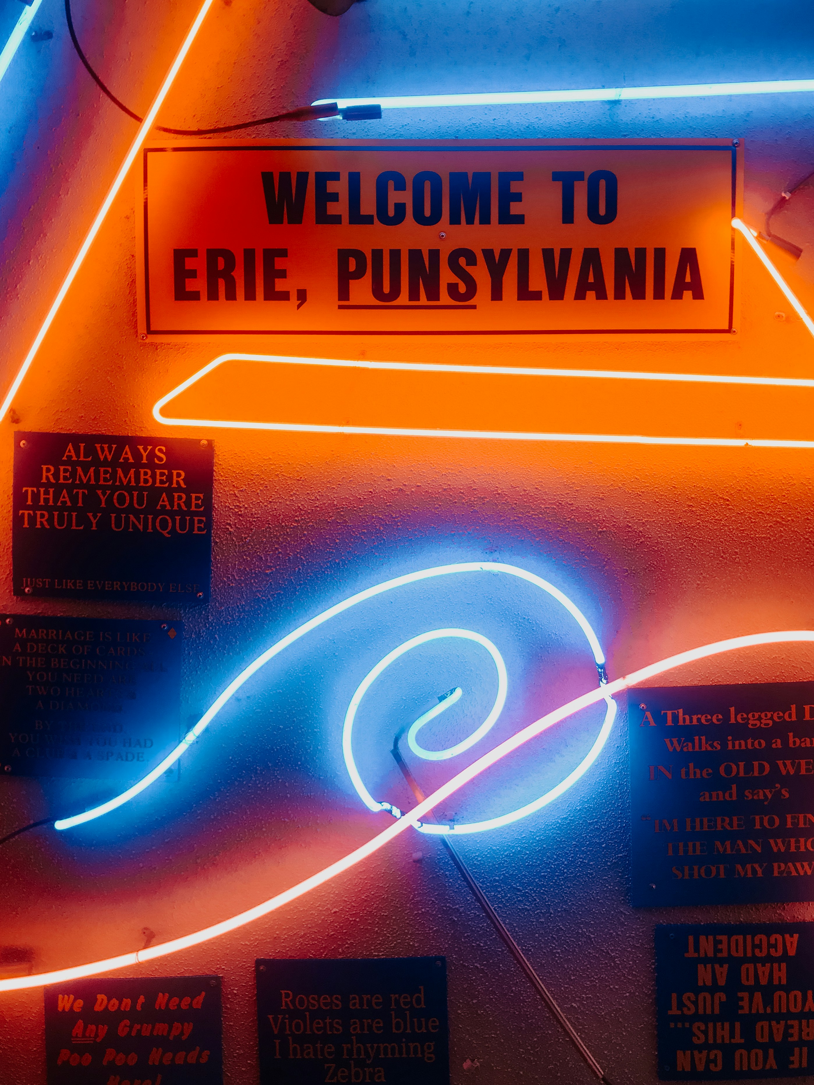 A neon sign that says welcome to erie, pennsylvania photo – Free Neon ...