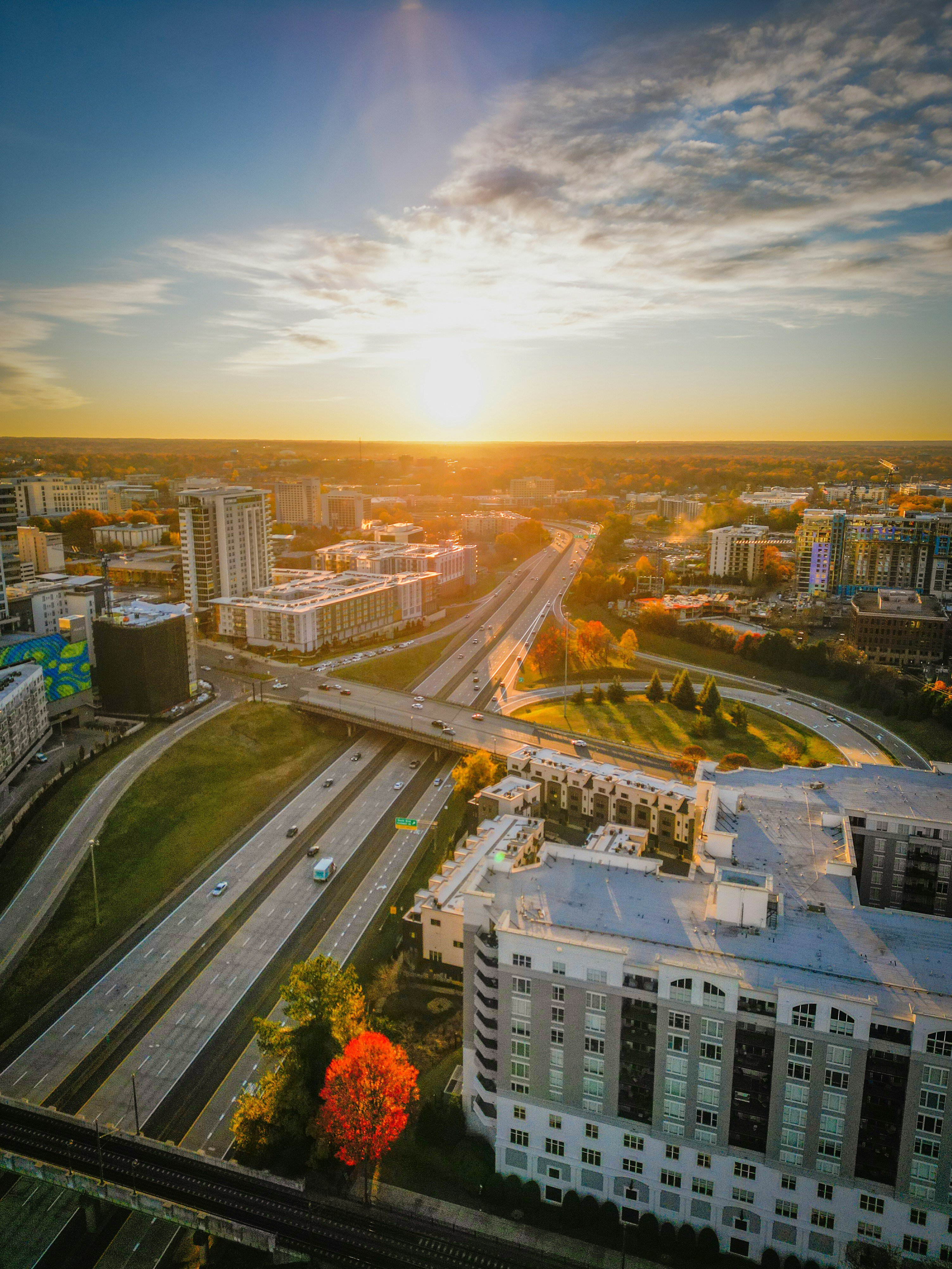 Sunrise at Charlotte NC | an aerial view of a city at sunset