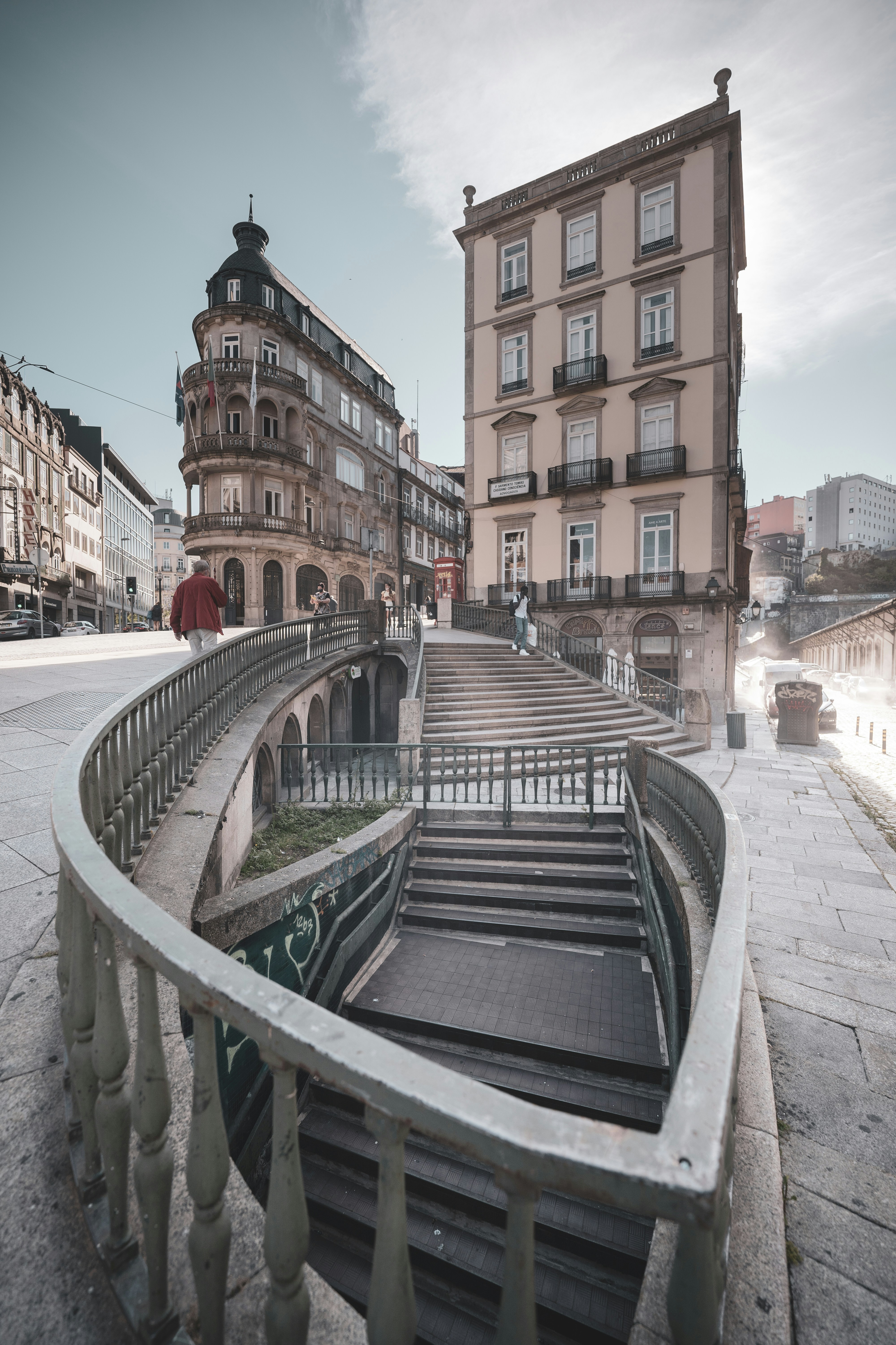 Staircase Between Facades: A Cityscape Unfolds in Stone and Light
