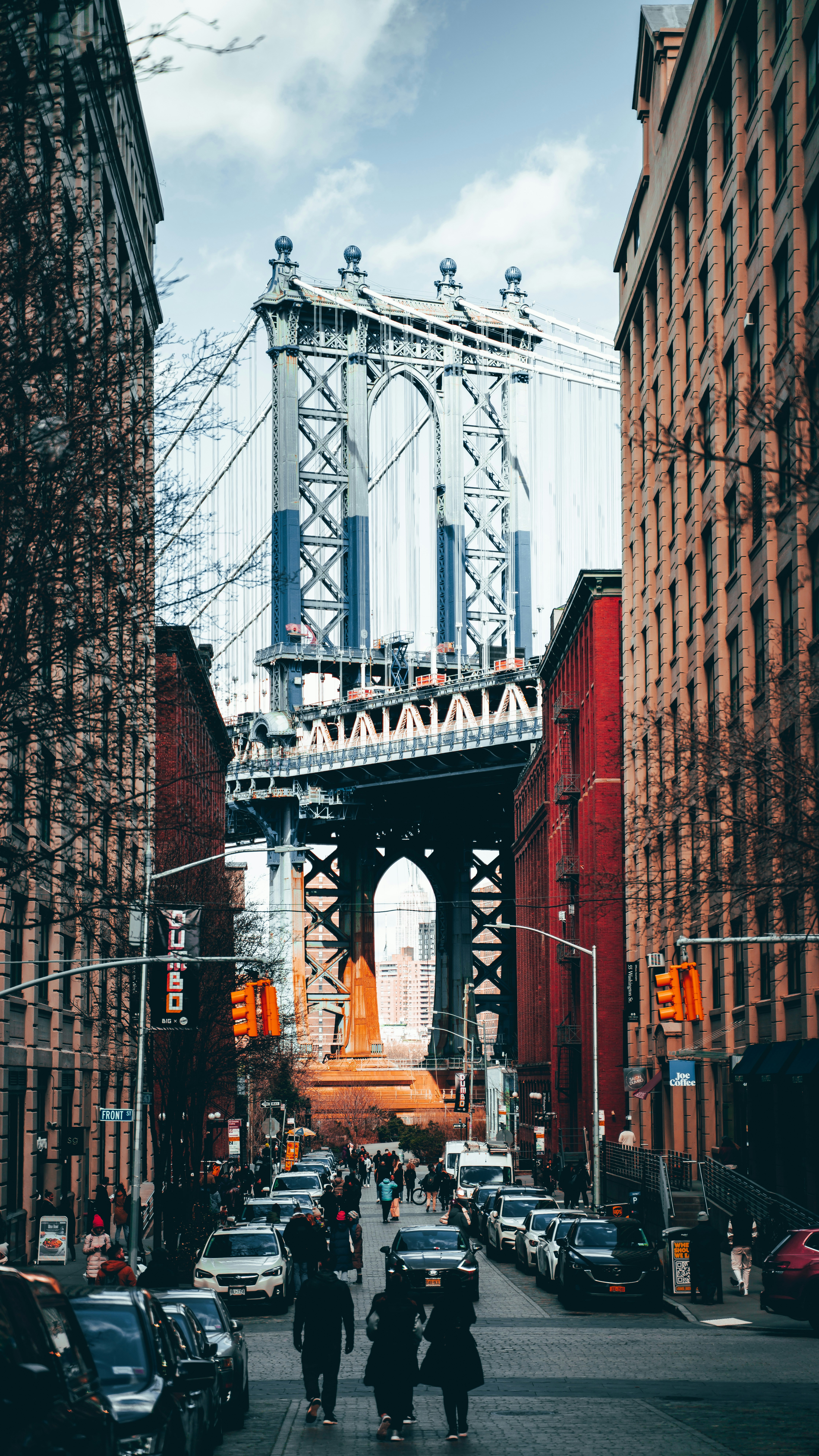 Under the Iron Arch: a City Street Framing the Bridge