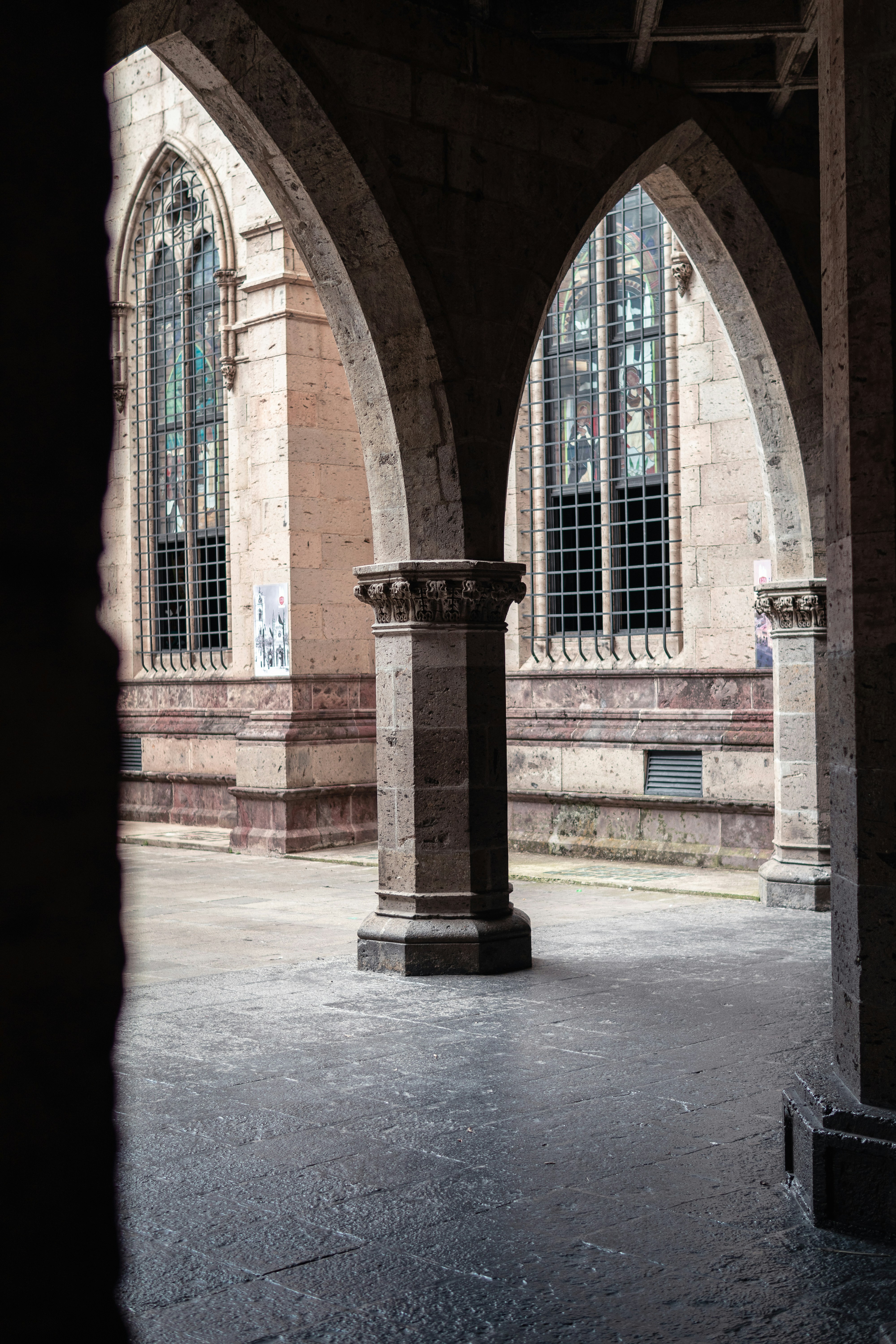 Arched Courtyard through a Stone Frame