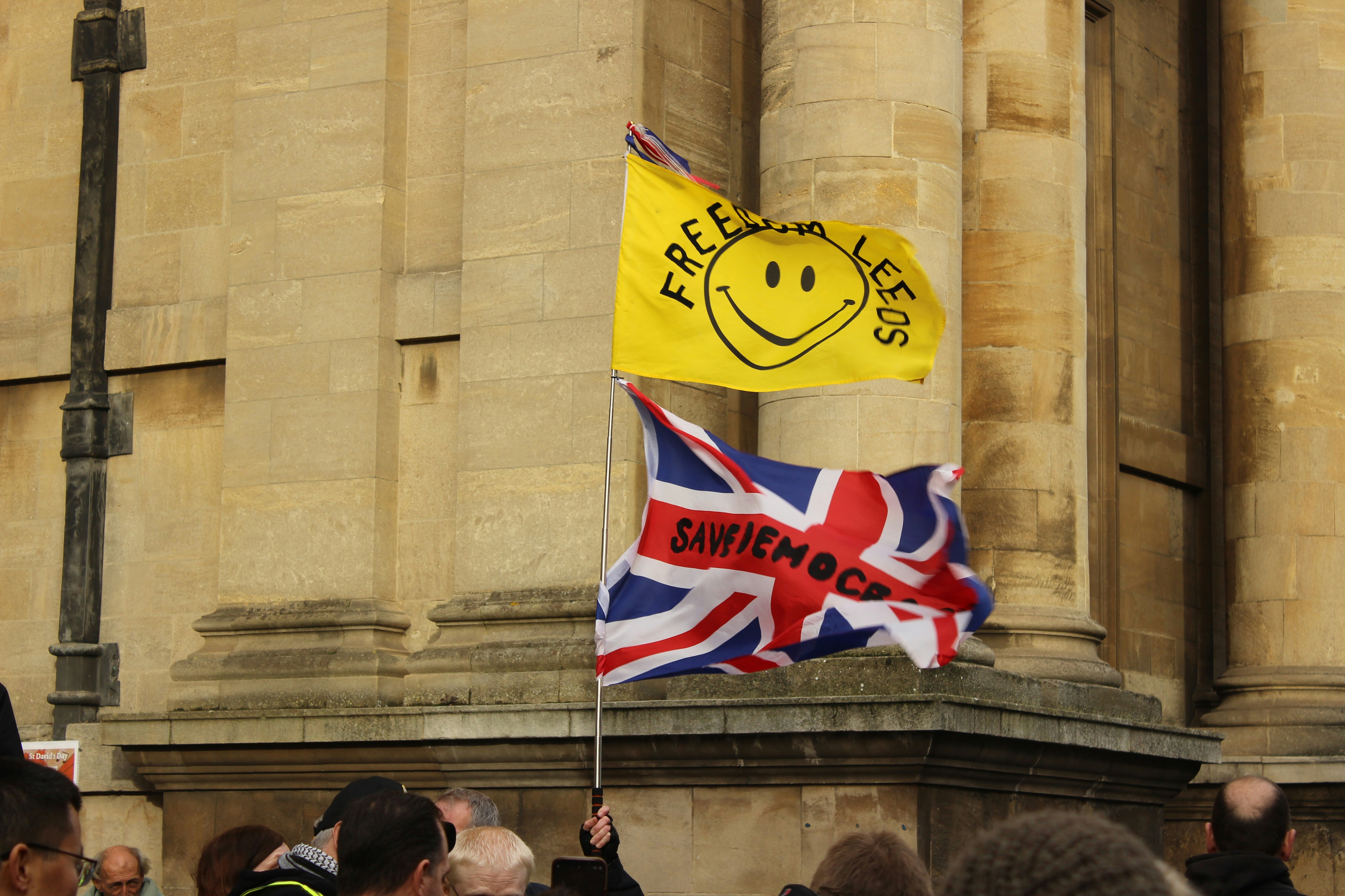 Smiley Flag Over Union Jack Above Neoclassical Steps: A Quiet Protest