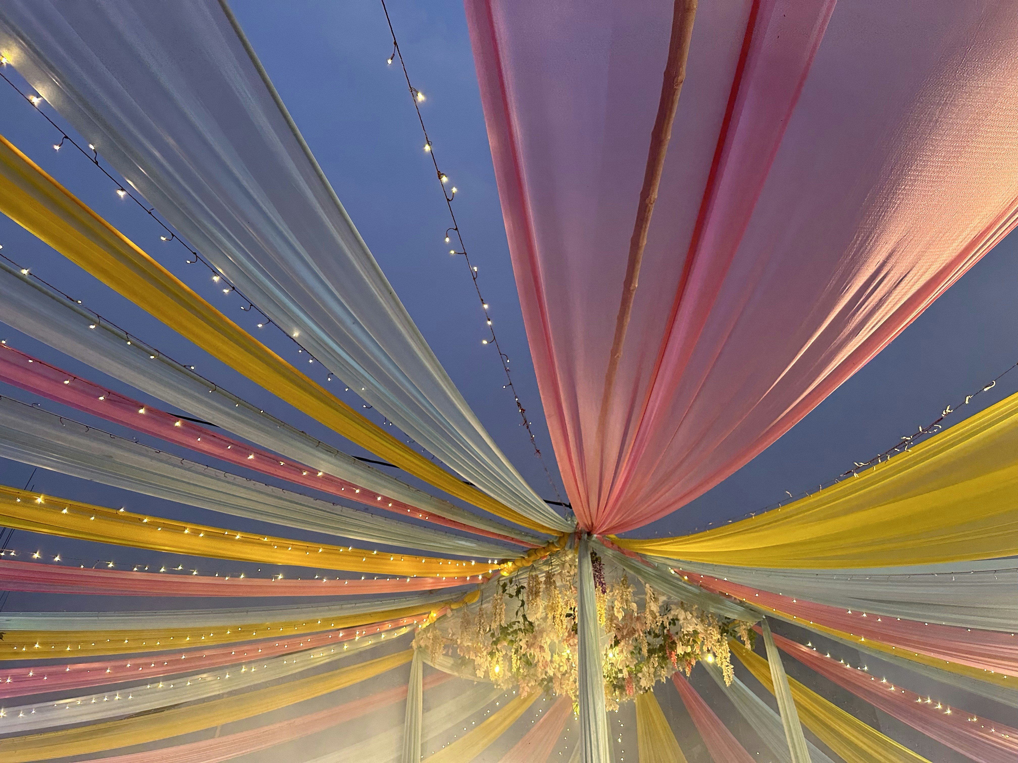 A colorfully decorated tent with lights and a chandelier photo – Free ...