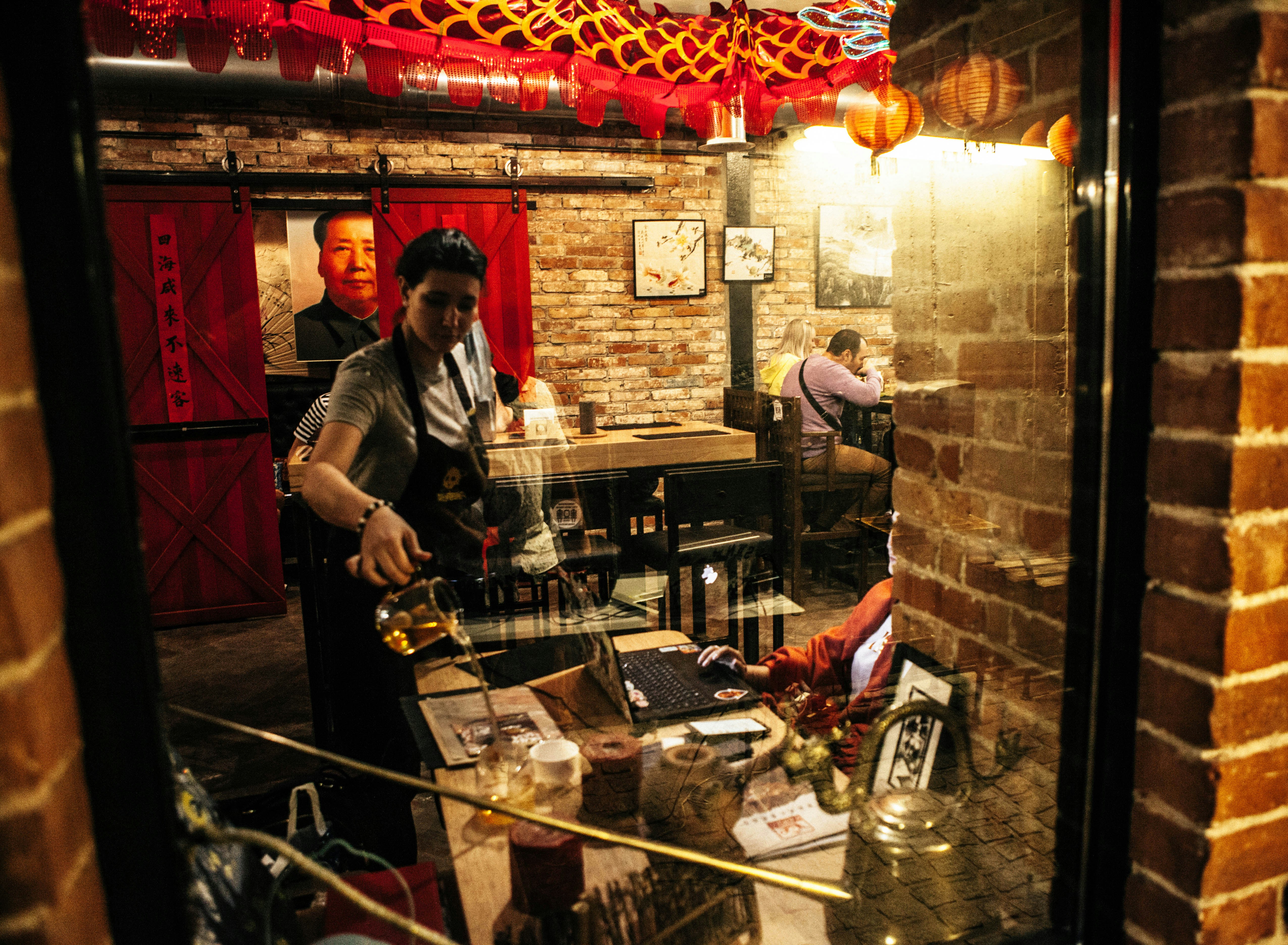 Lanterns Over Glass: A Quiet Pour Through Brick-Walled Ambience