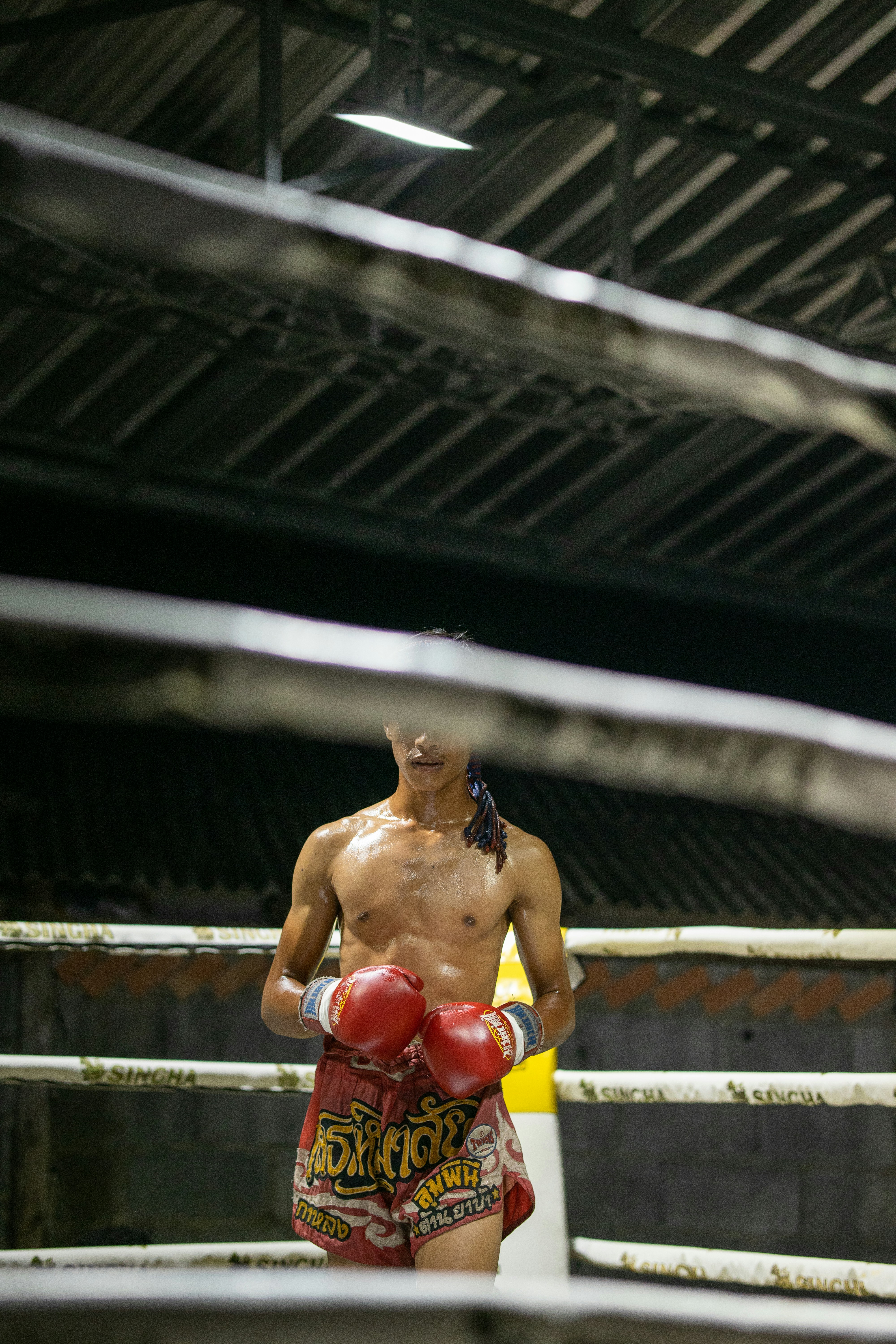 Between the Ropes: A Quiet Moment of Focus in the Ring