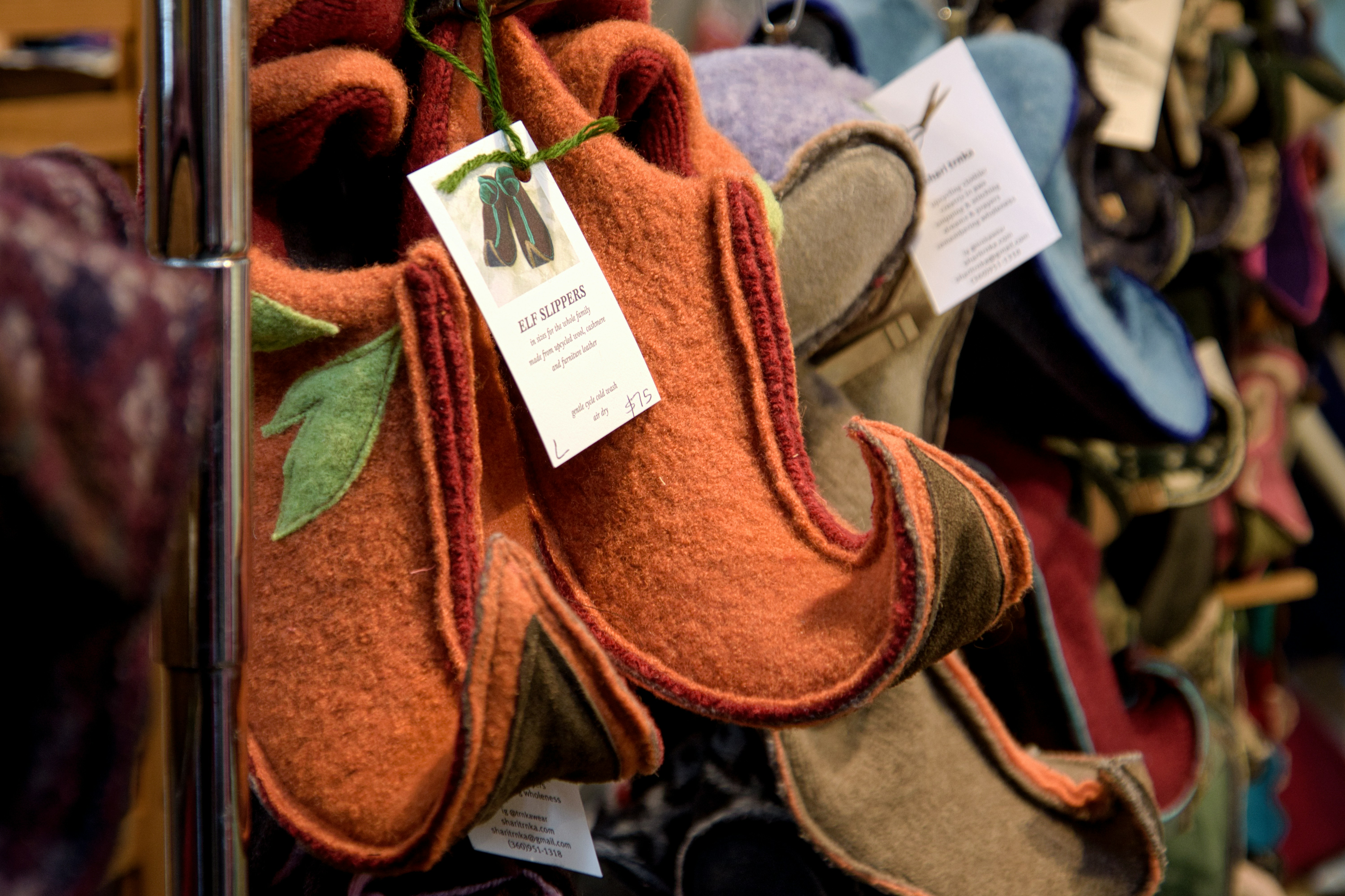 A pile of slippers with a price tag on them photo – Free Shoes Image on ...
