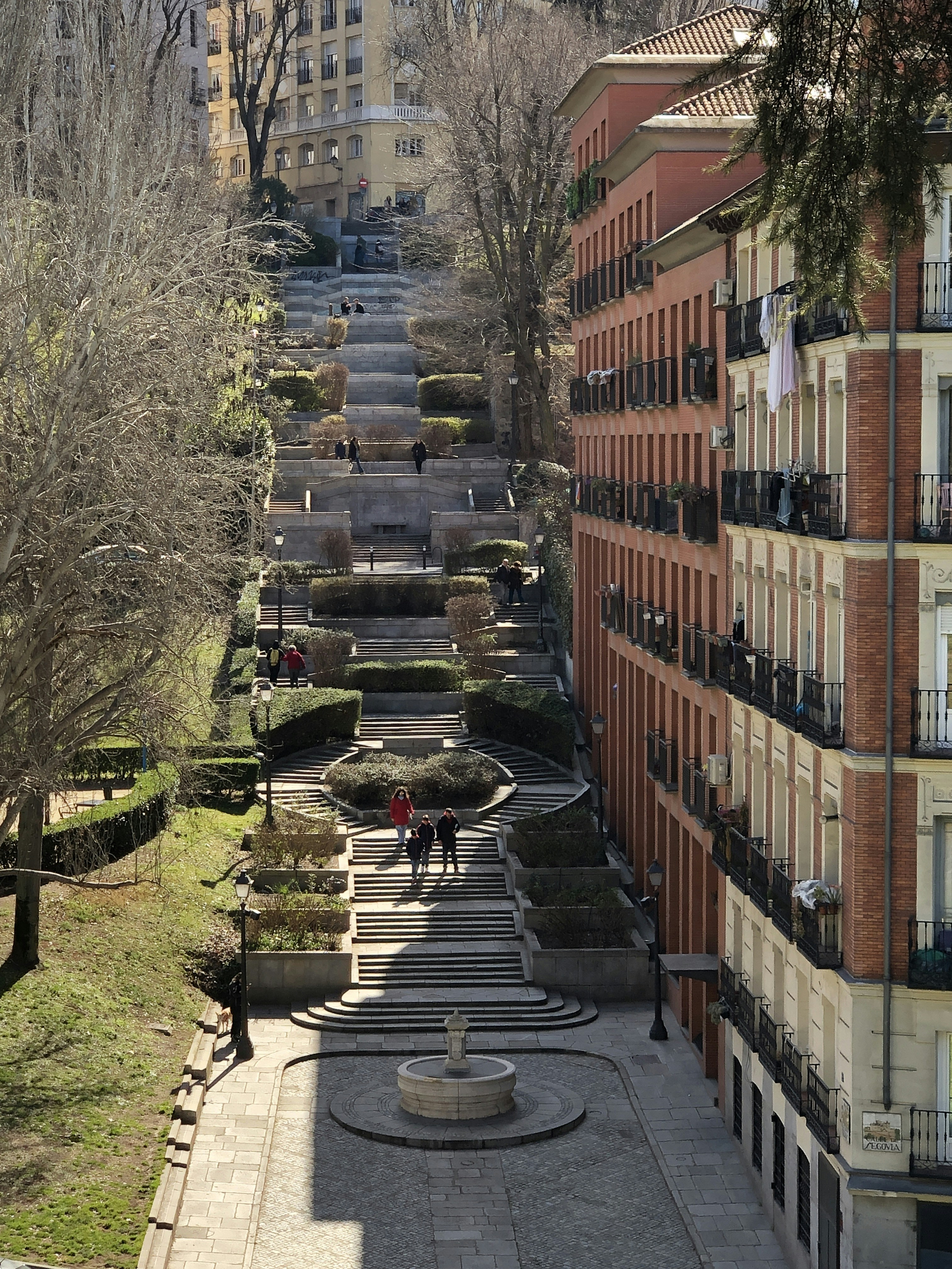 Urban Staircase Panorama: Steps to a Sunlit Plaza