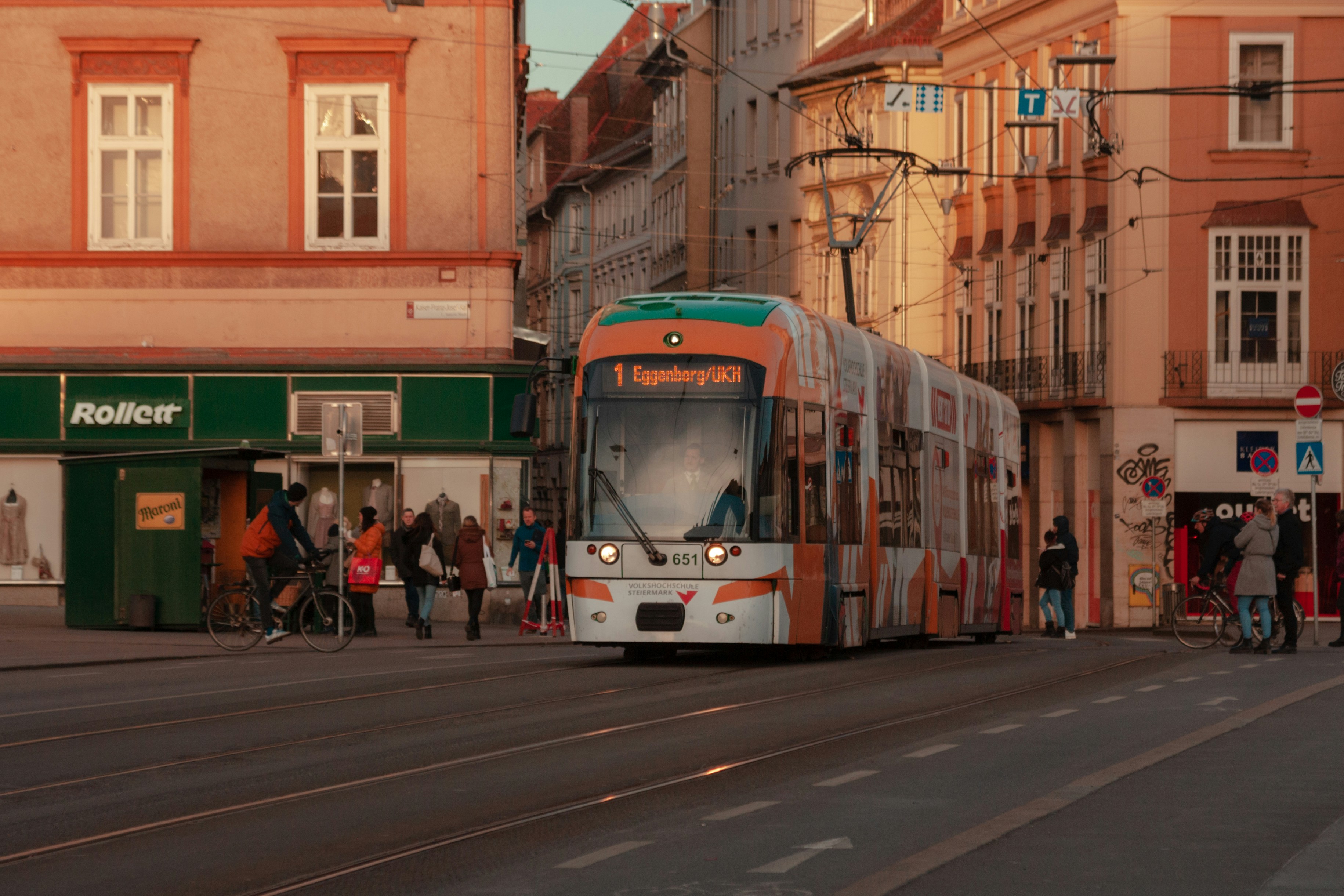 A public transit bus on a city street photo – Free Austria Image on ...
