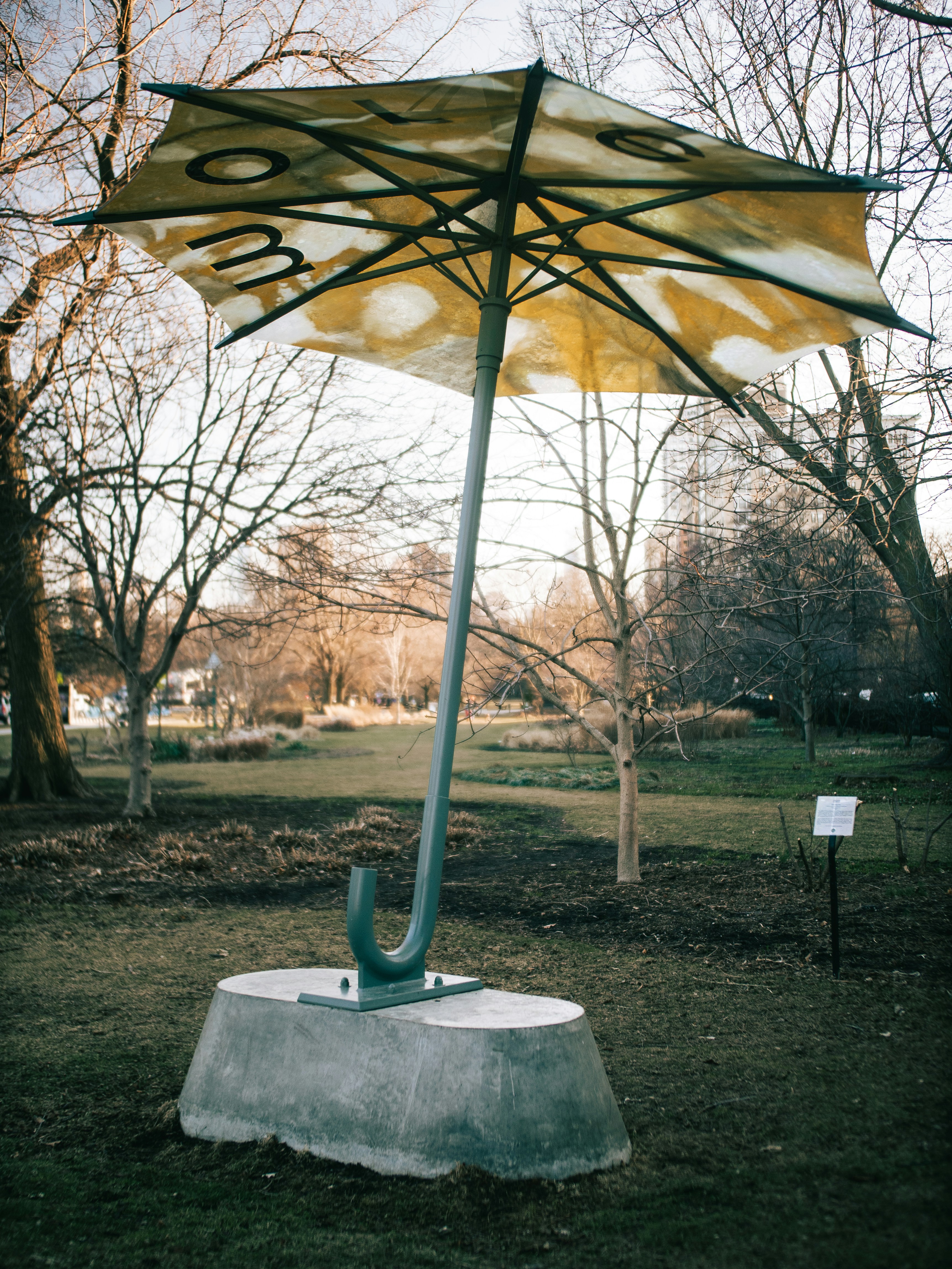 Oversized Umbrella Sculpture Anchors a Quiet Winter Park