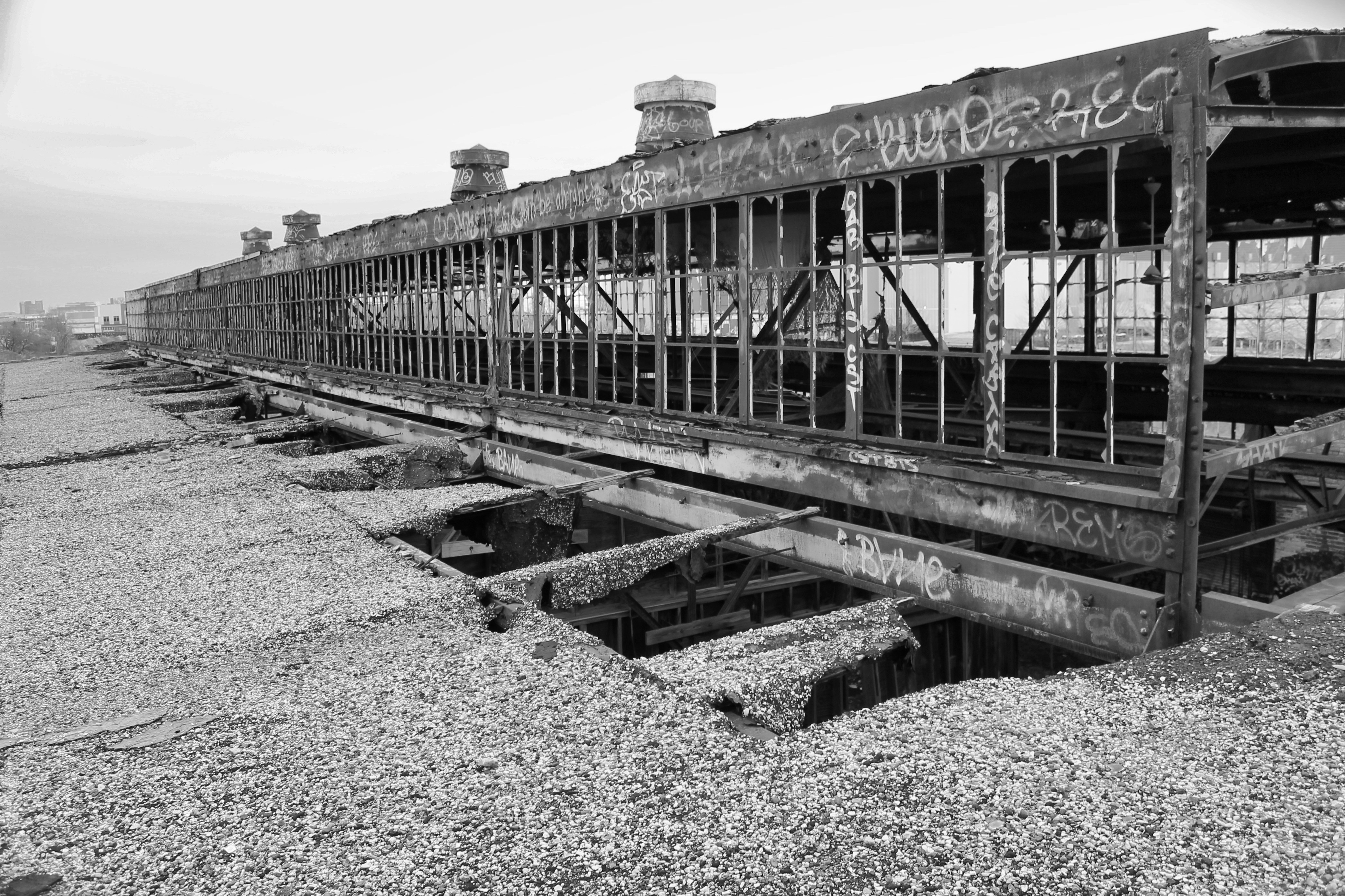 Graffitied Rails: A Monochrome Walk Through Abandoned Machinery