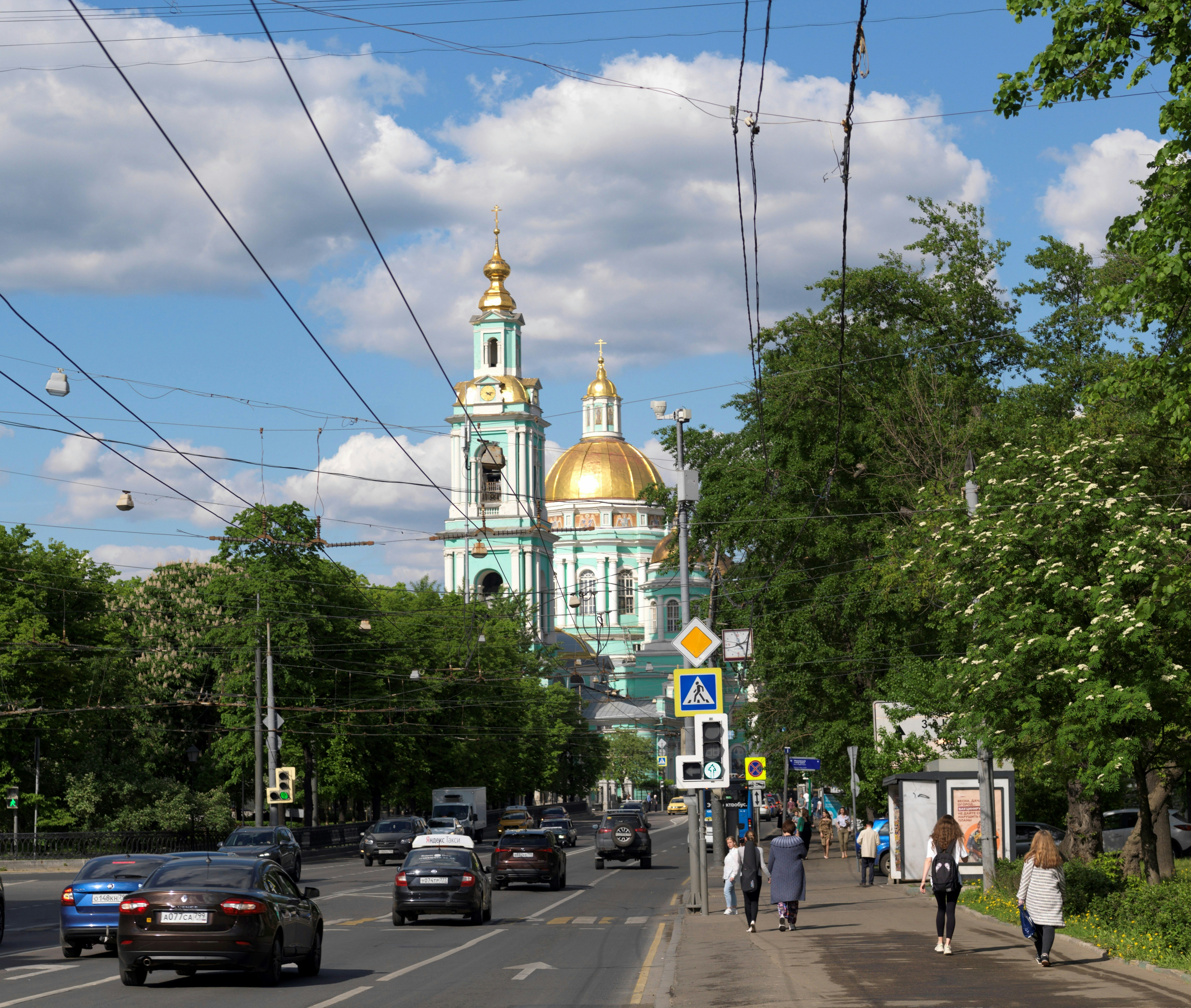 #misura_photos #misuraphotos https://www.youtube.com/user/Moscowartgallery vk.com/scanart From the series #Spiritualcentersofmoscow The Epiphany Cathedral at Yelokhovo, if you like my works, I have more on my profile page - Please check them out! Don't forget to subscribe, press a like button, add my photo to your collections, share it with your friends and download it if you like! See you! | a group of people walking down a street next to a church