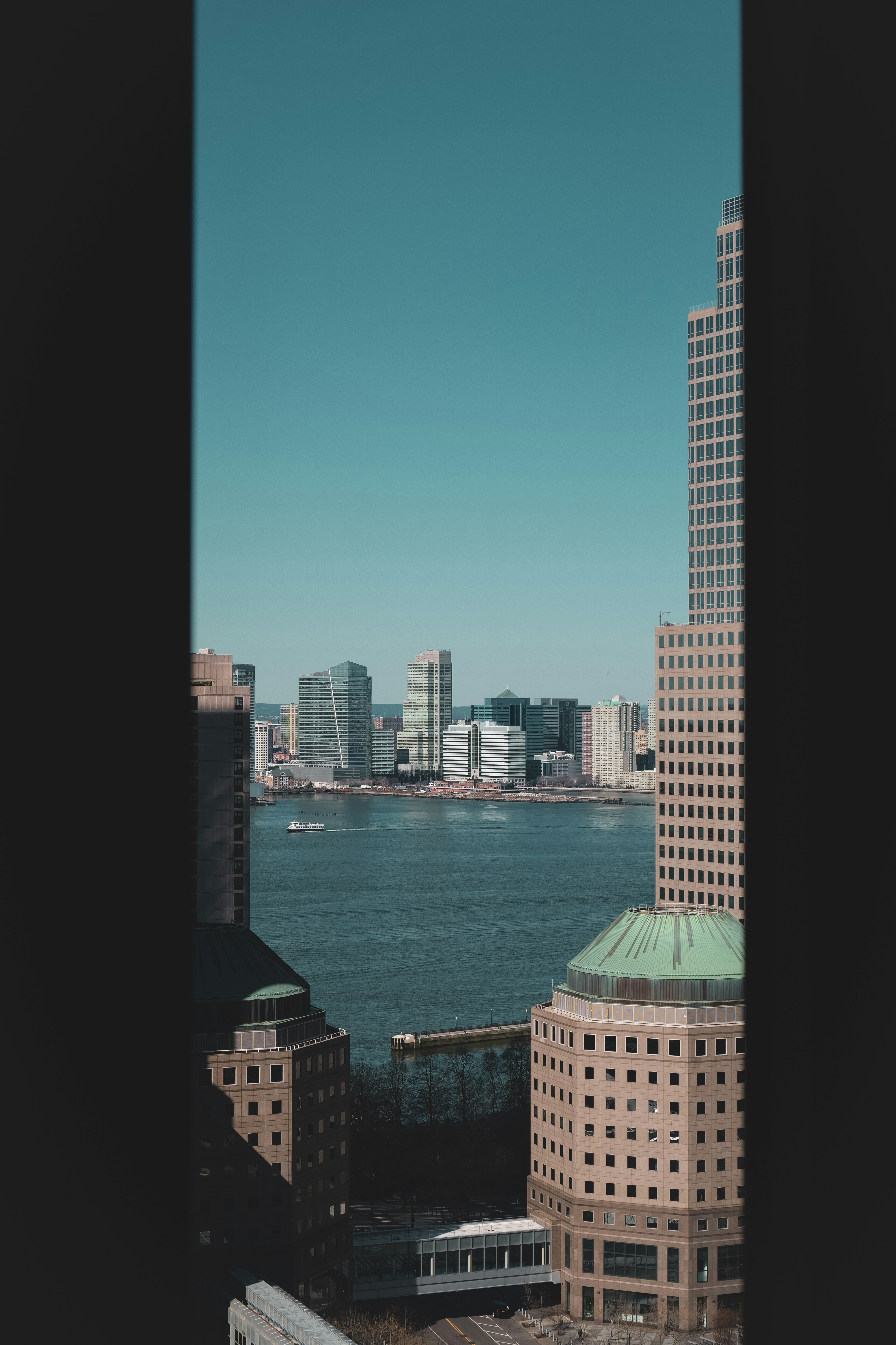 A view of a large body of water from a high rise building photo – Free ...
