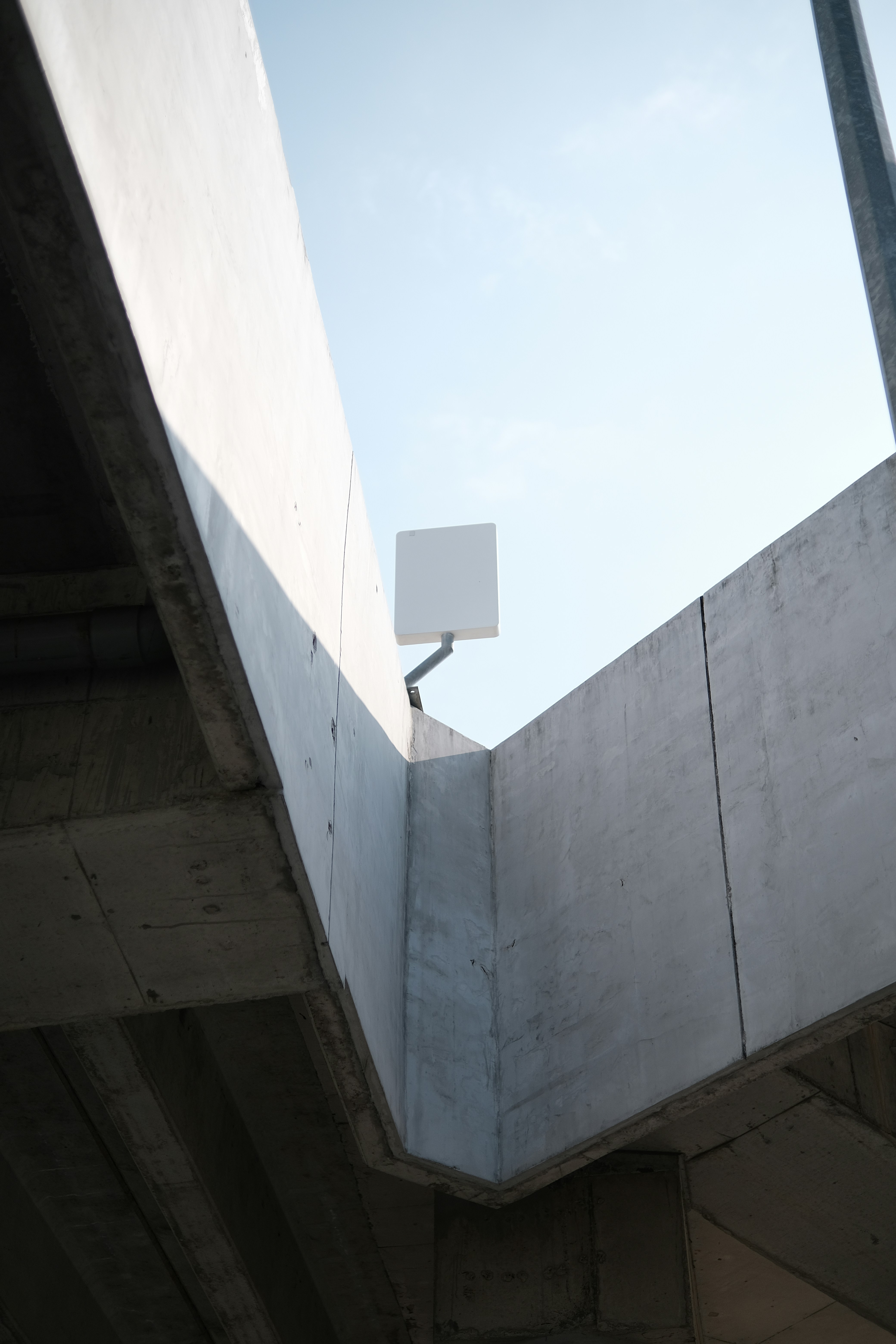 Beacon on the Concrete Ridge: A Minimalist Skyward Moment