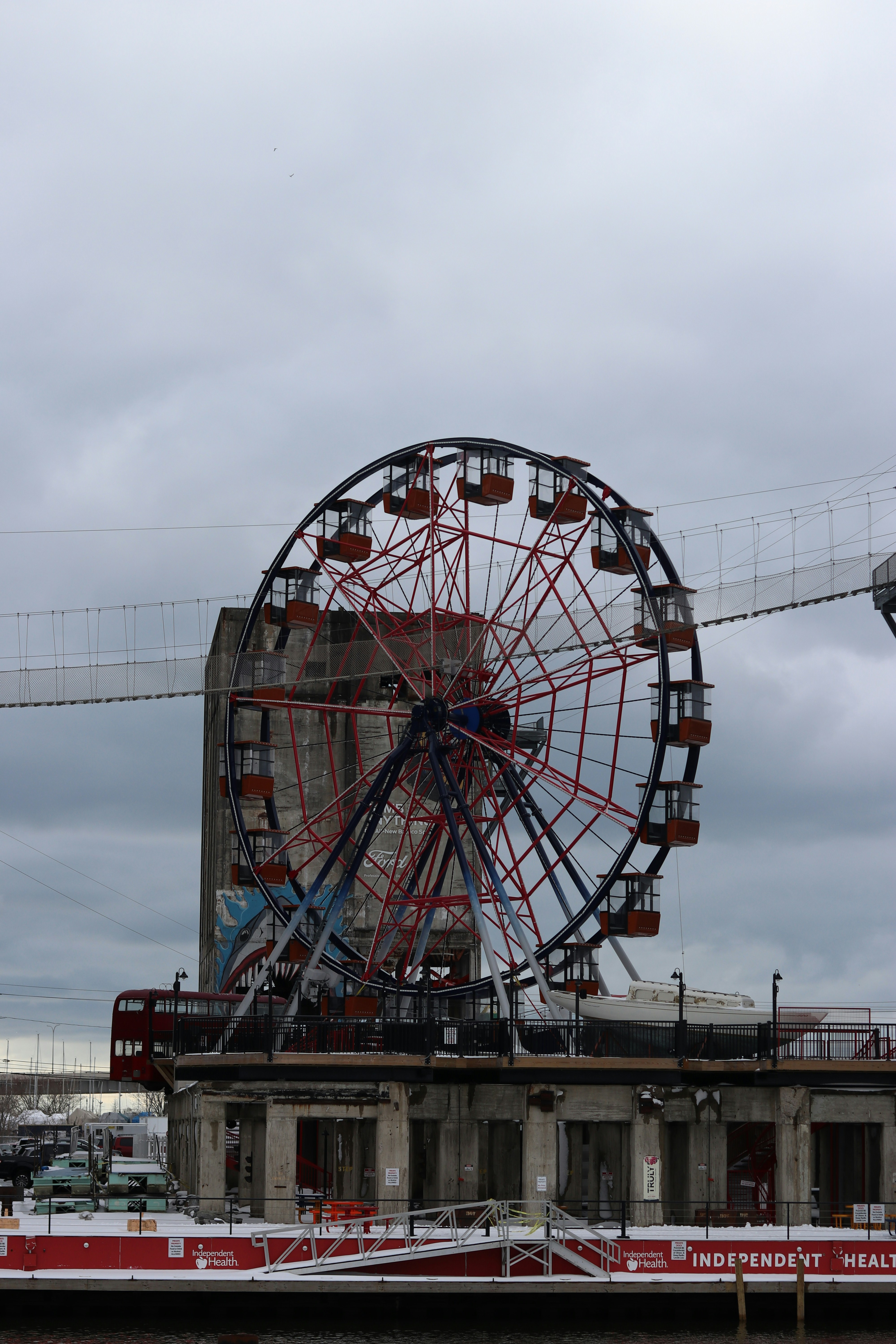 A ferris wheel sitting on top of a pier photo – Free Ferris wheel Image ...