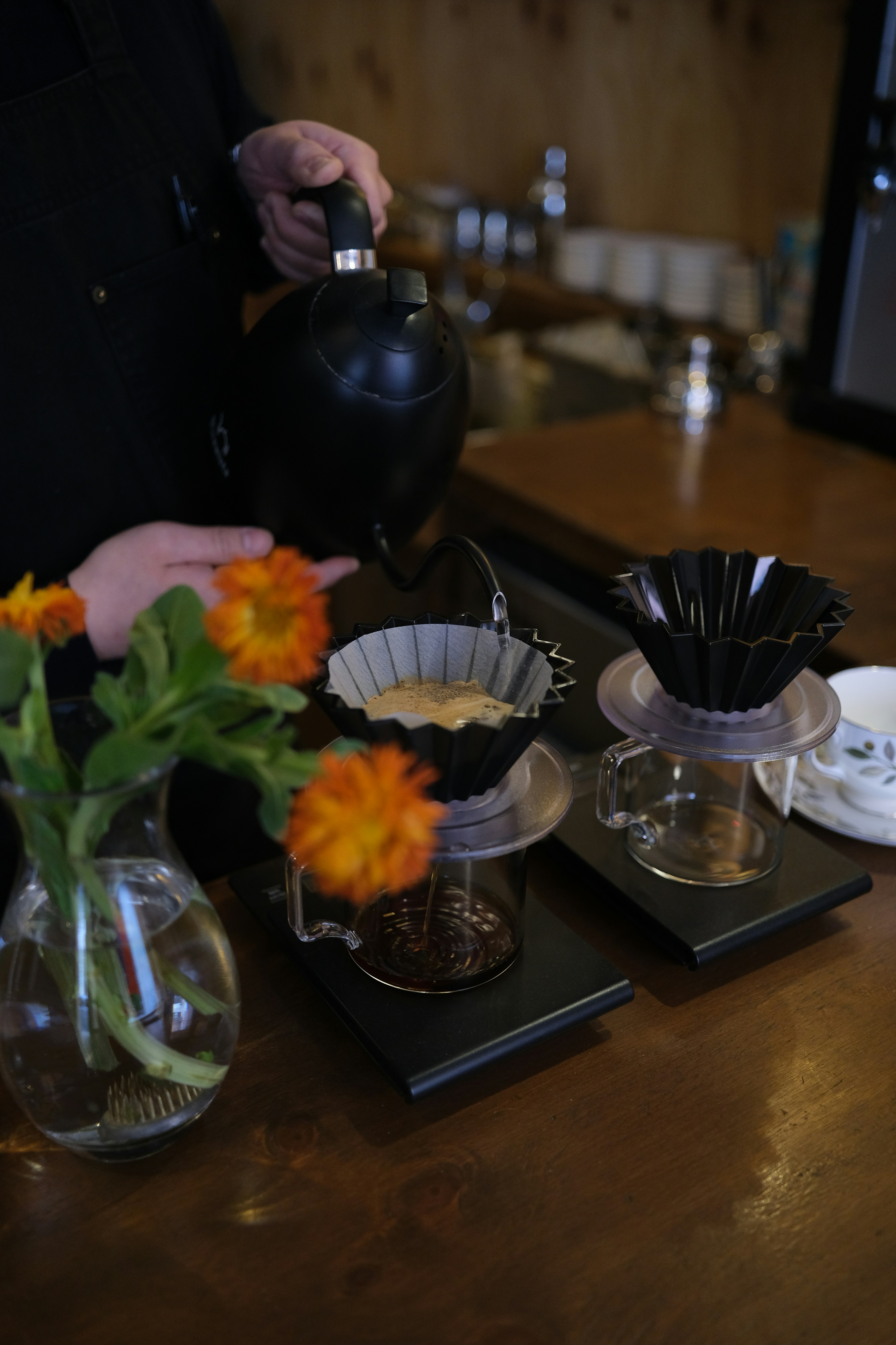Pour-over Ritual: A Barista’s Quiet Moment with Two Drippers