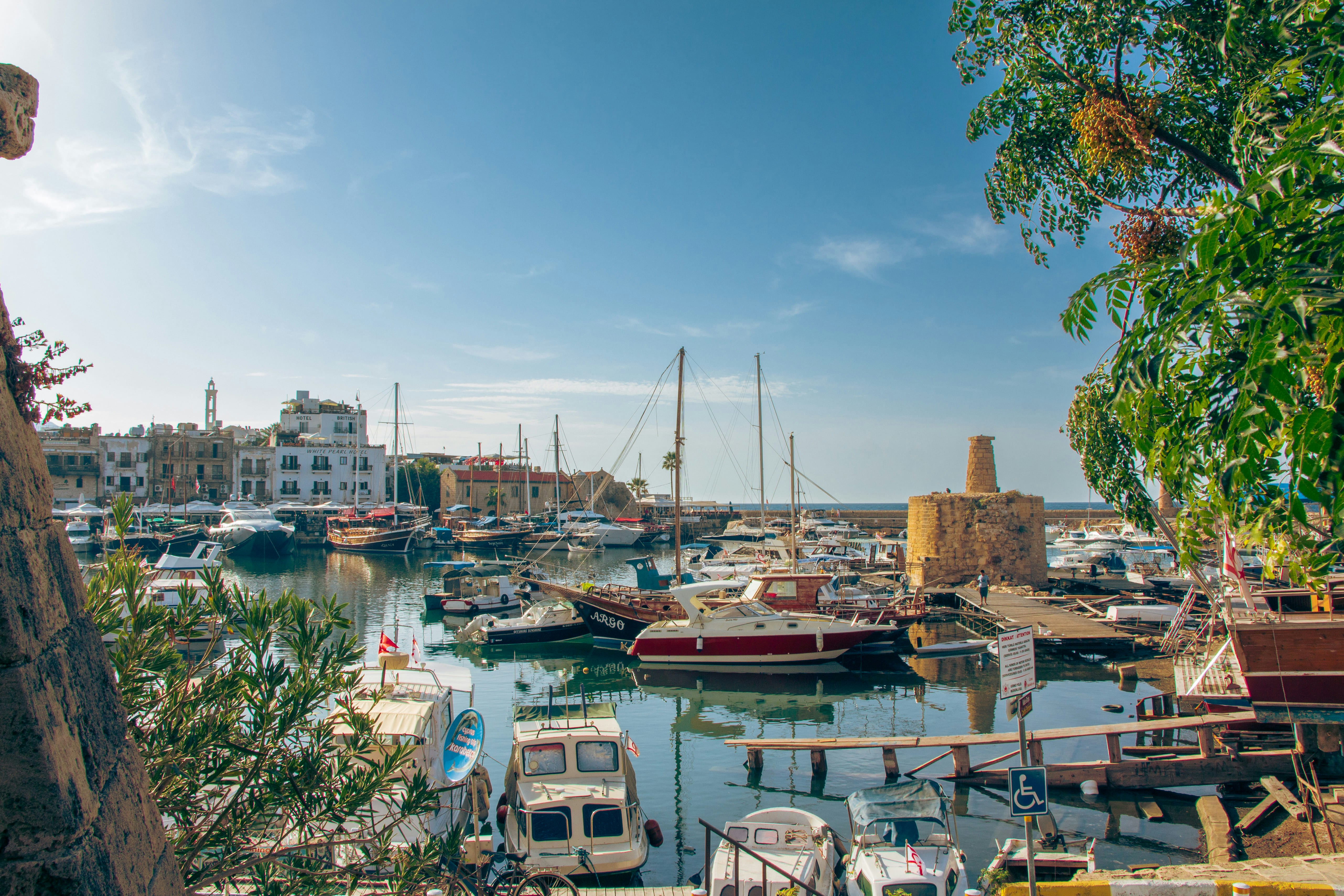 A harbor filled with lots of small boats photo – Free Harbor Image on ...