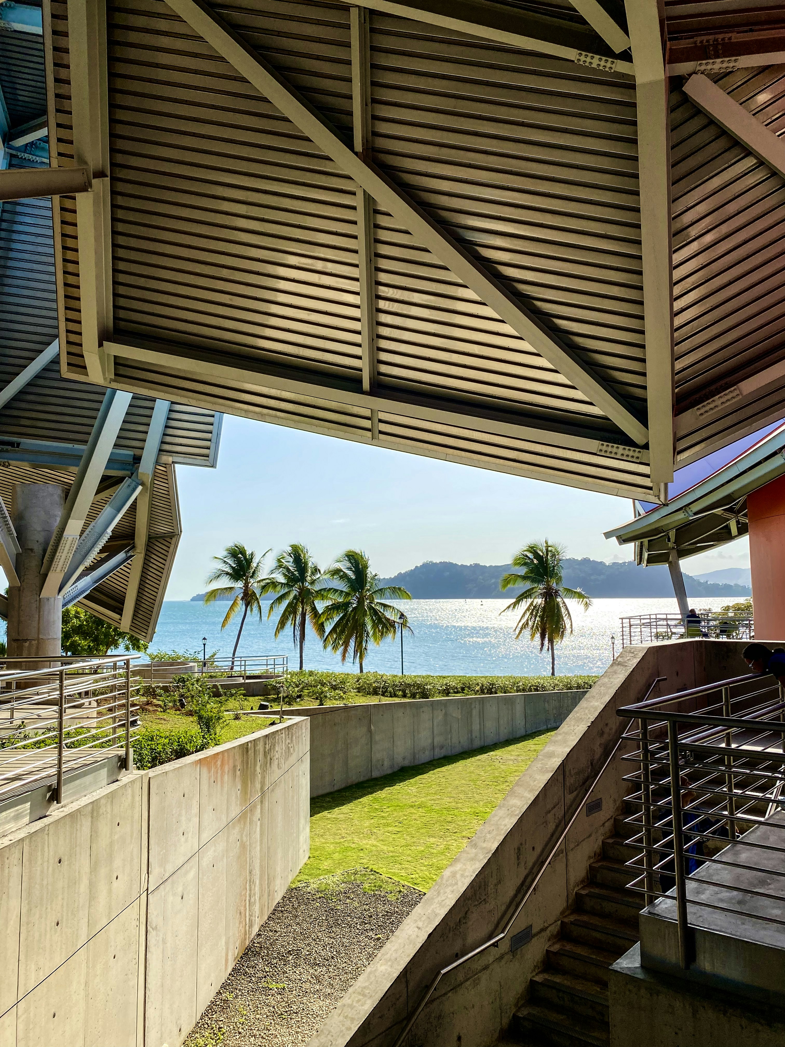 a view of the ocean from inside a building
