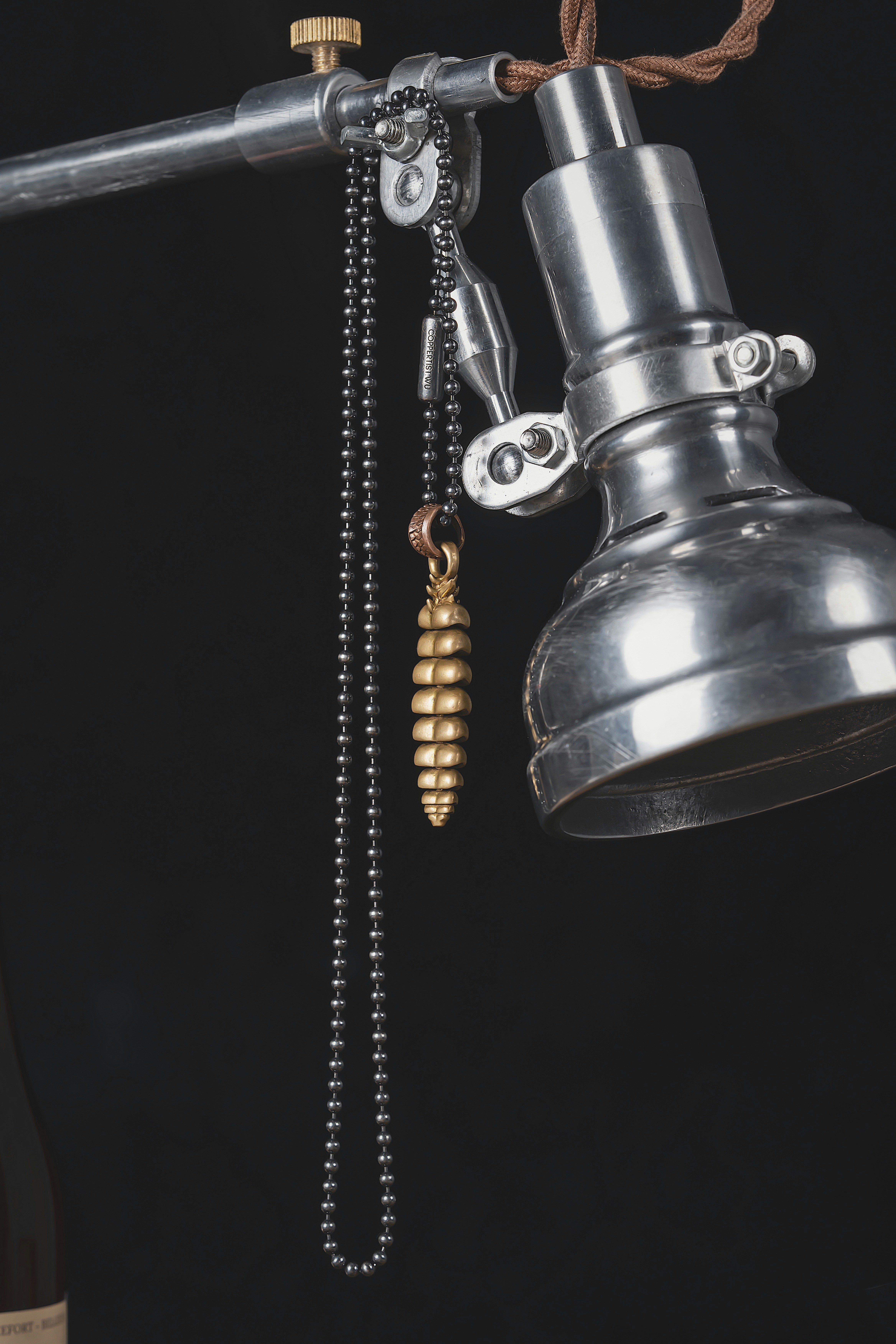 Chrome Convergence: Close-Up of a Vintage Lamp’s Mechanical Heart