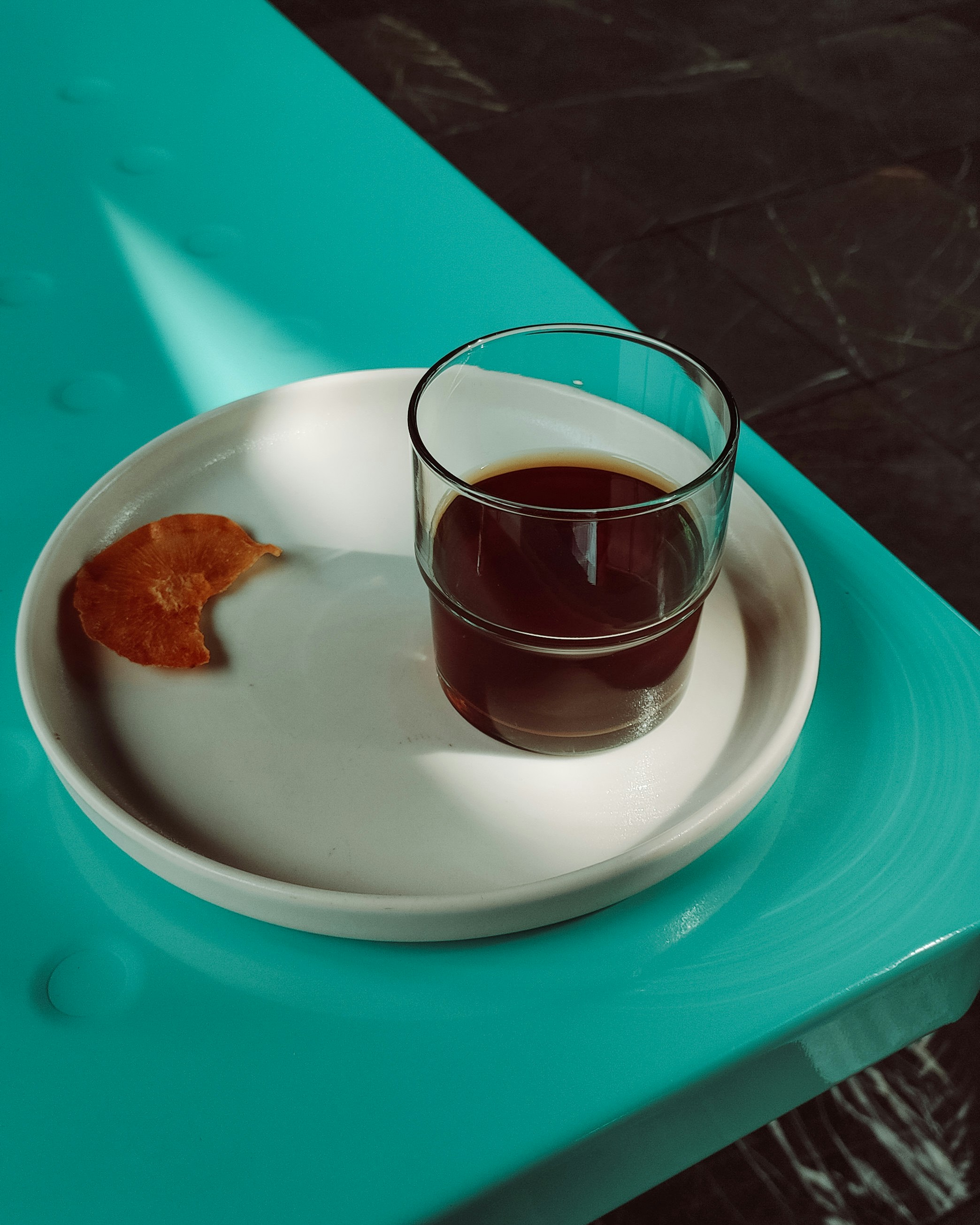 Espresso on a Turquoise Stage: A Minimal Still Life
