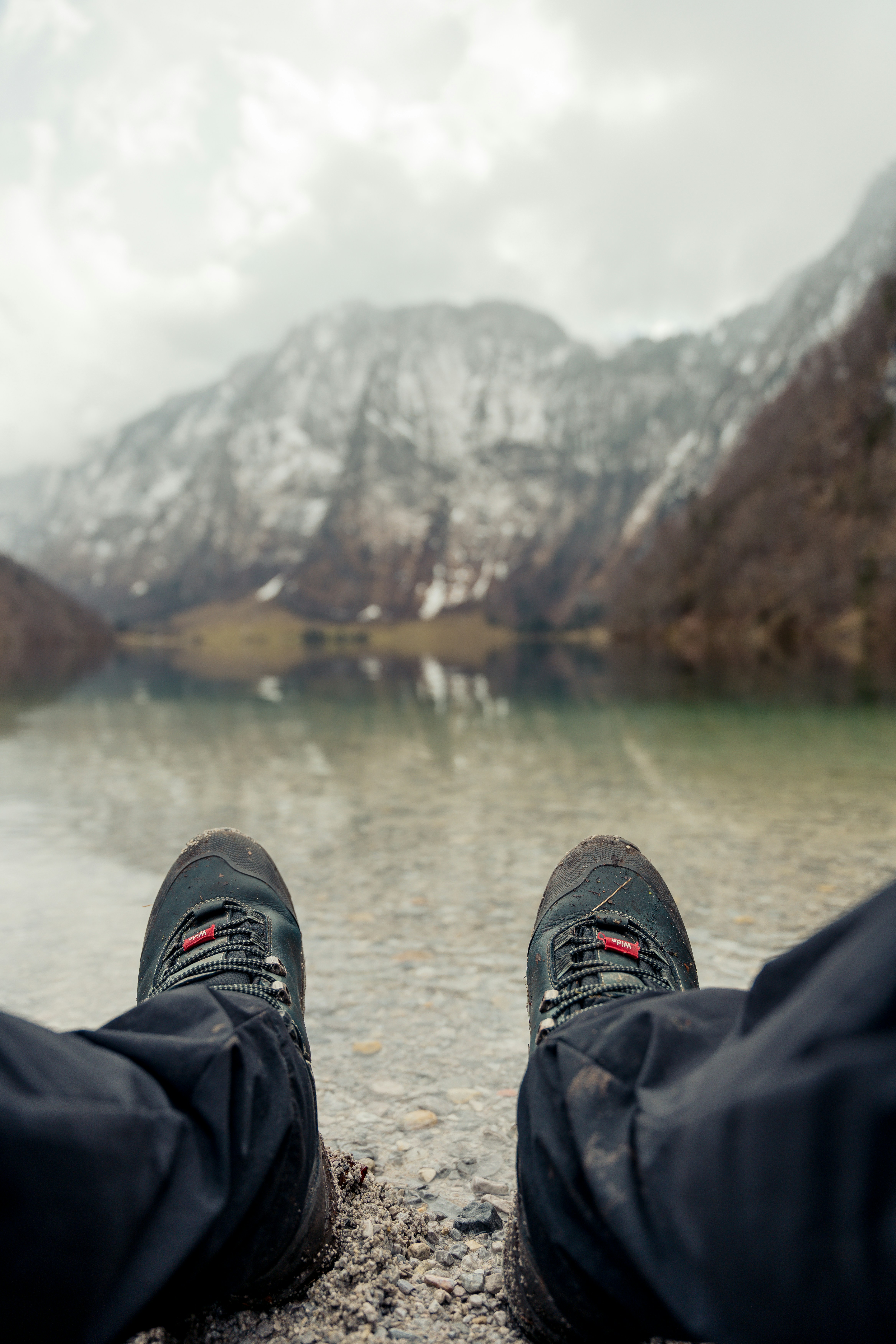 Boots at the Edge: A Quiet Lakeside Morning