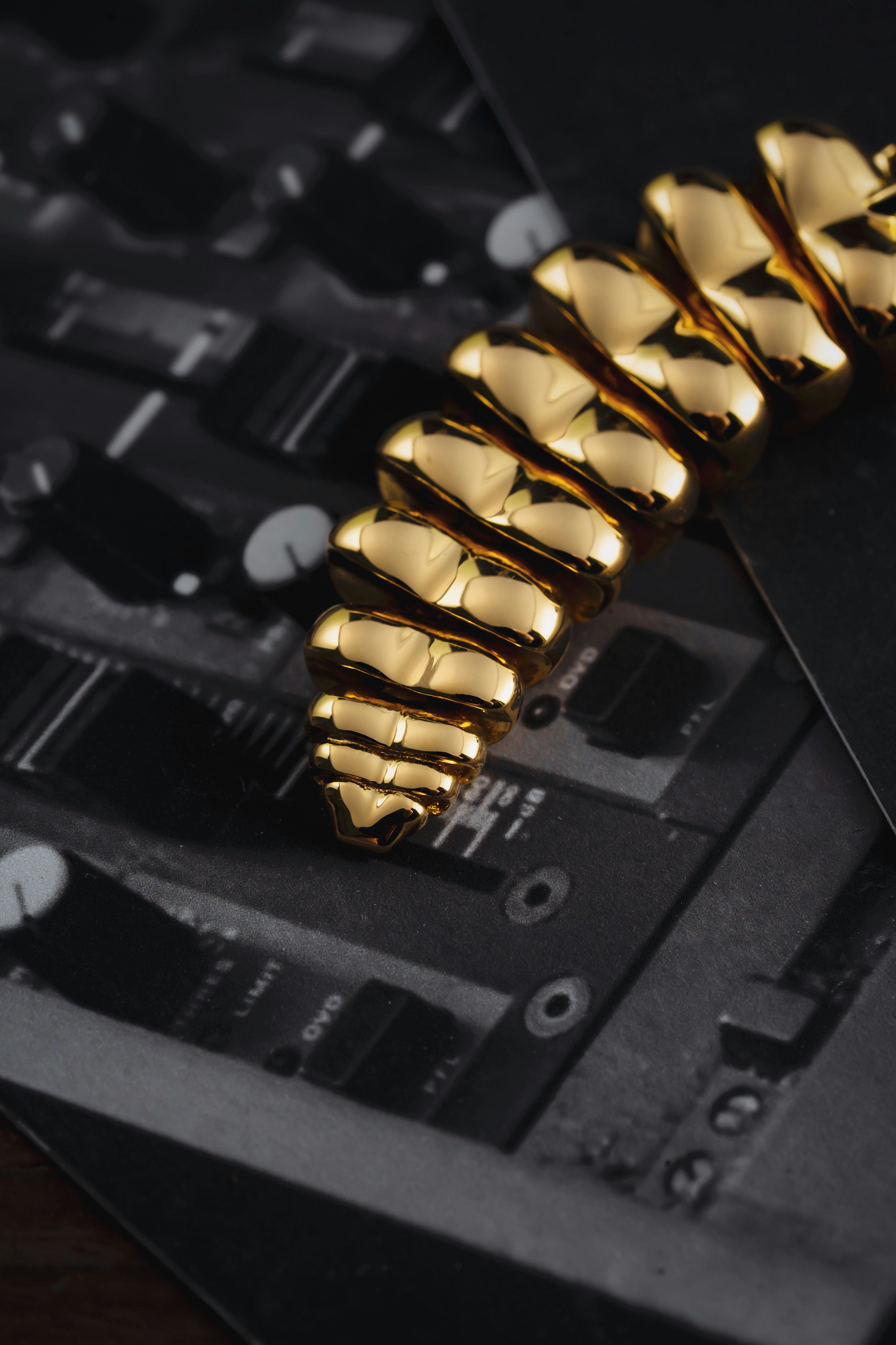 A close up of a metal object on a table photo – Free Computer Image on ...