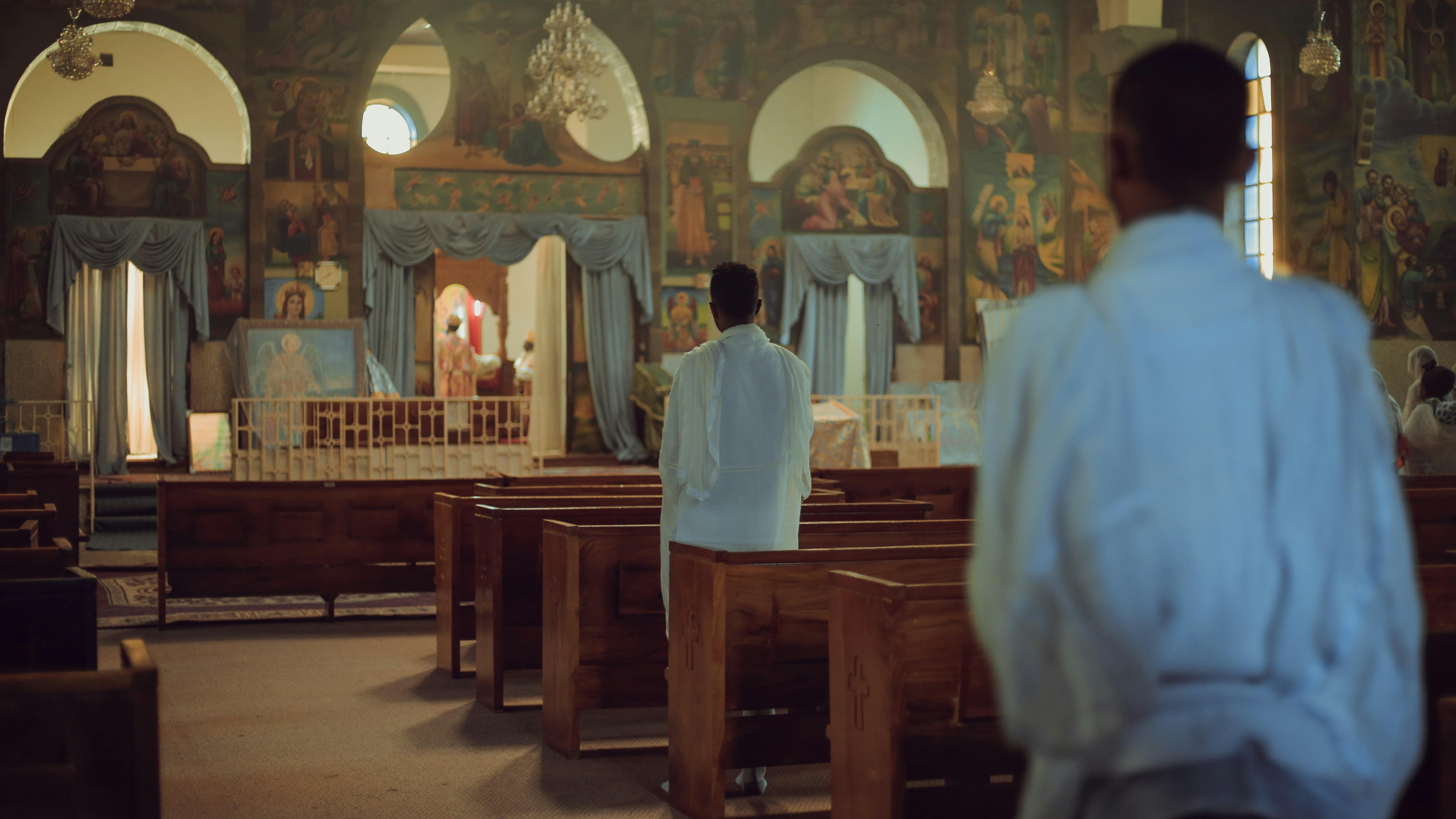 A man standing in front of a pew in a church photo – Free Addis ababa ...