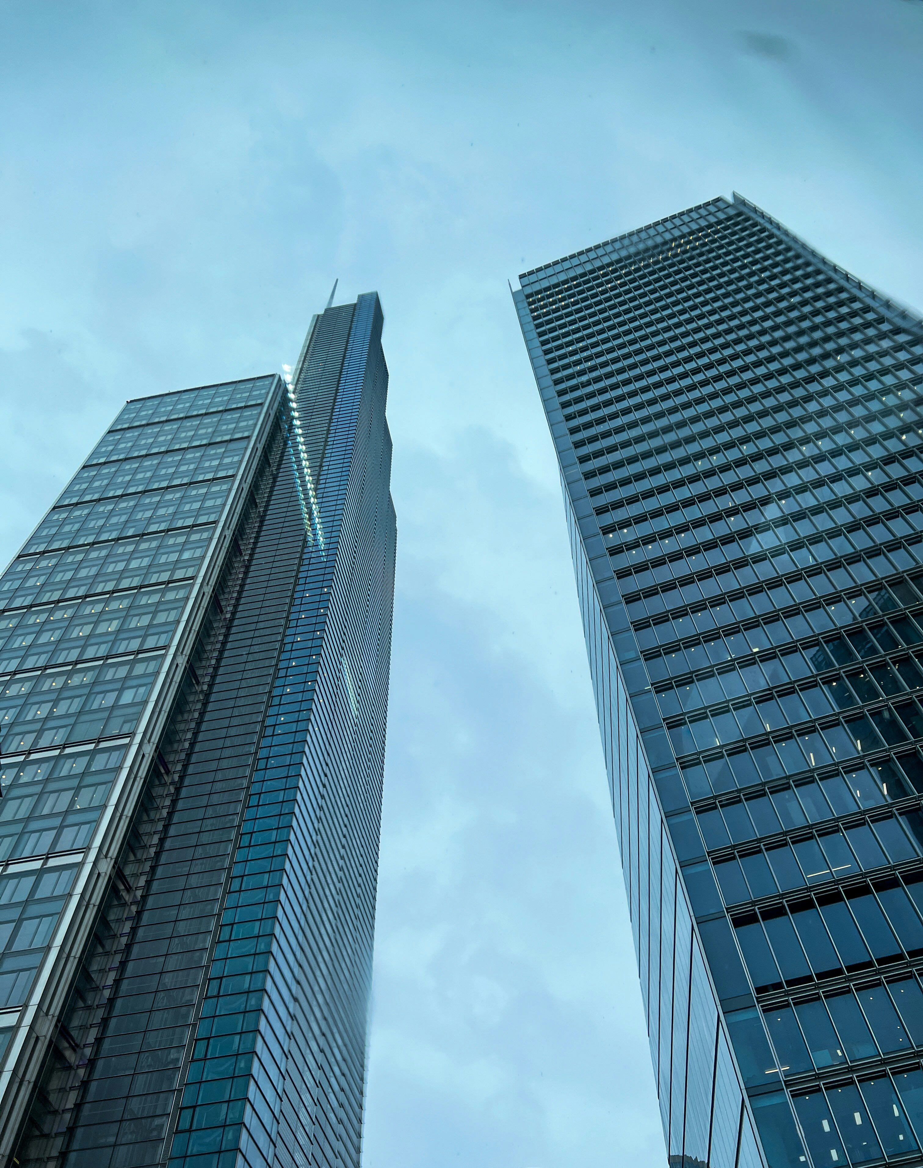 Two very tall buildings in a big city photo – Free Building Image on ...