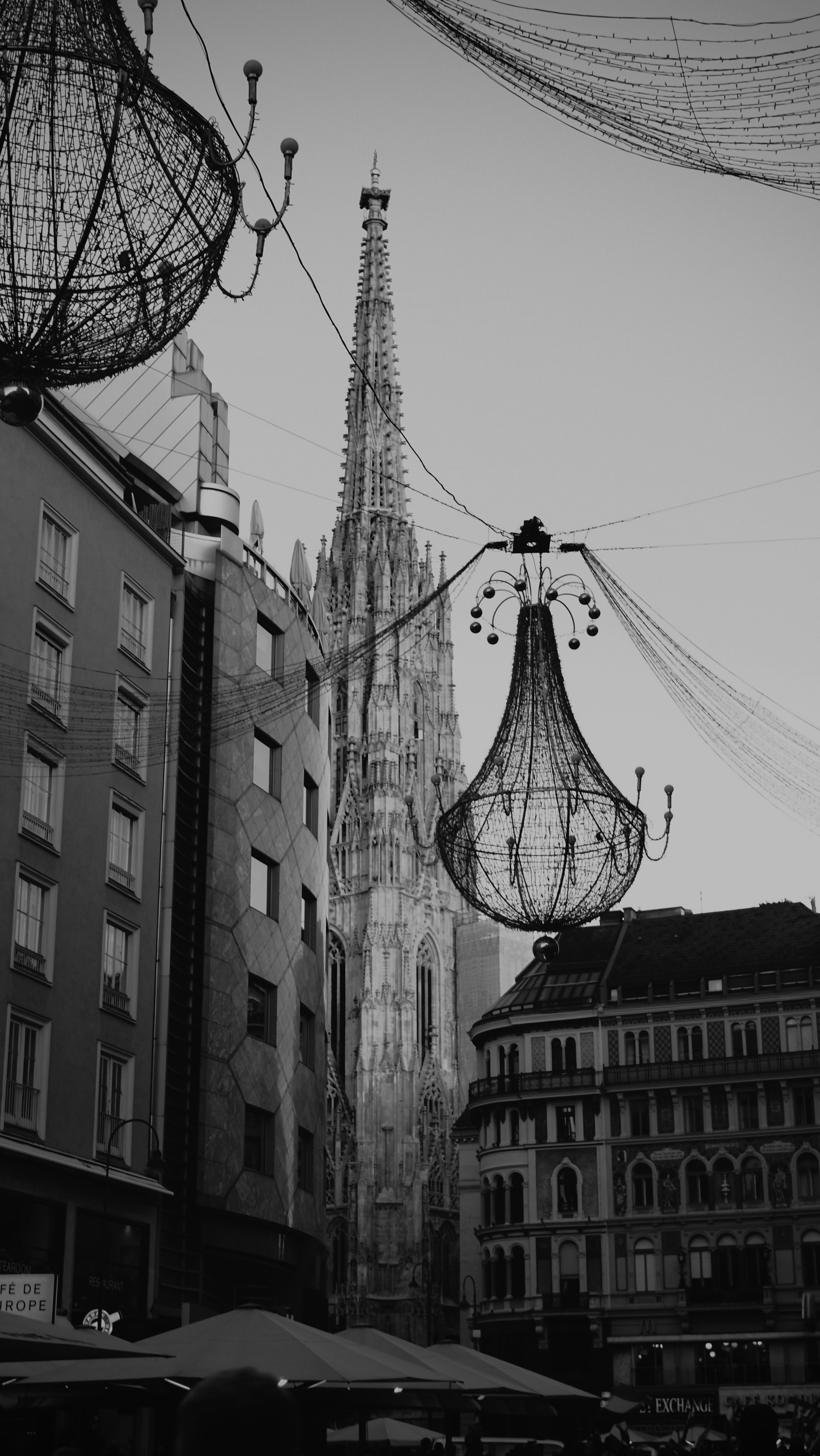 Gothic Needle Framed by a Web of Lanterns
