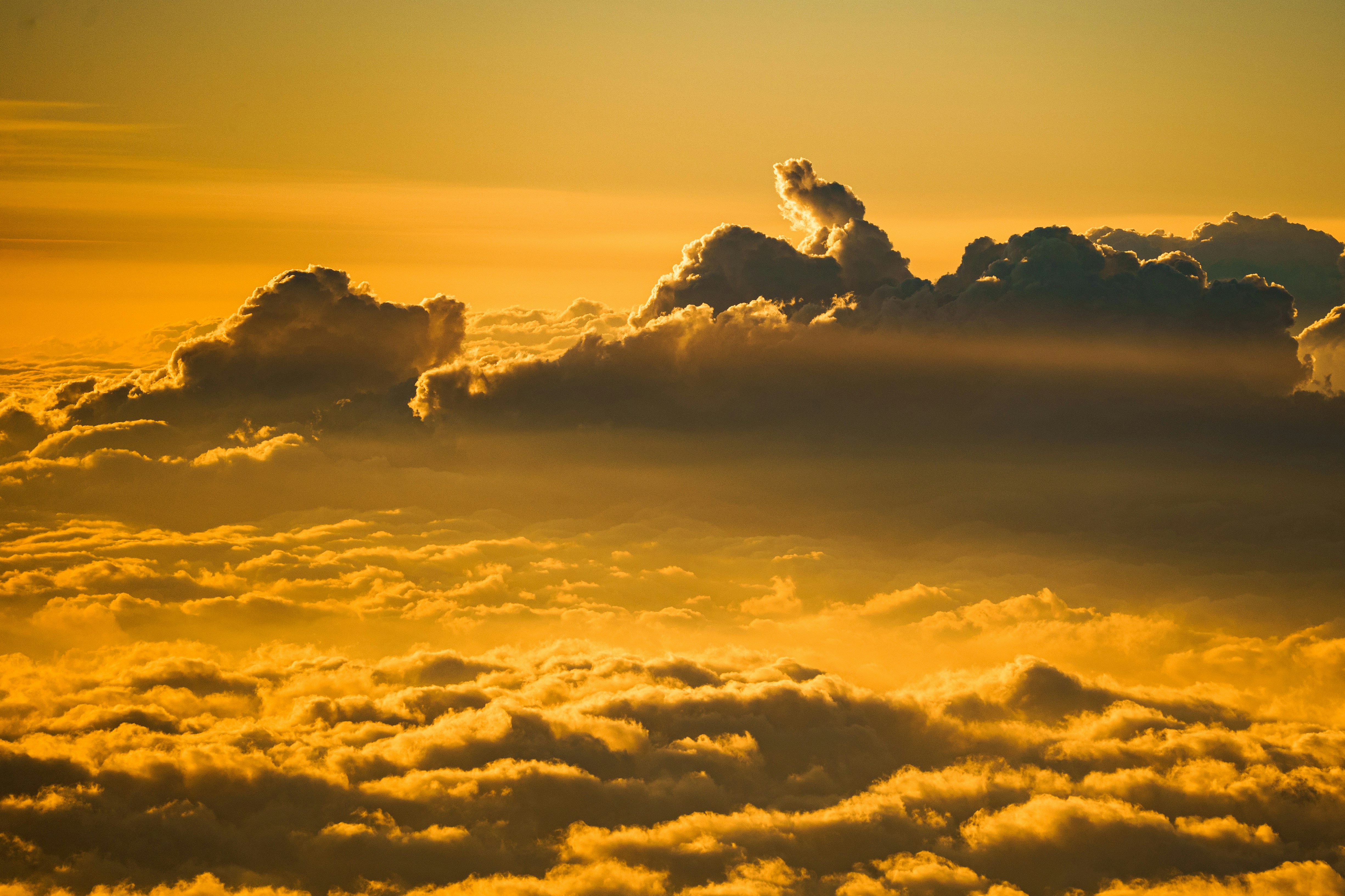 Amber Crown Over a Dusk-Drawn Cloudscape