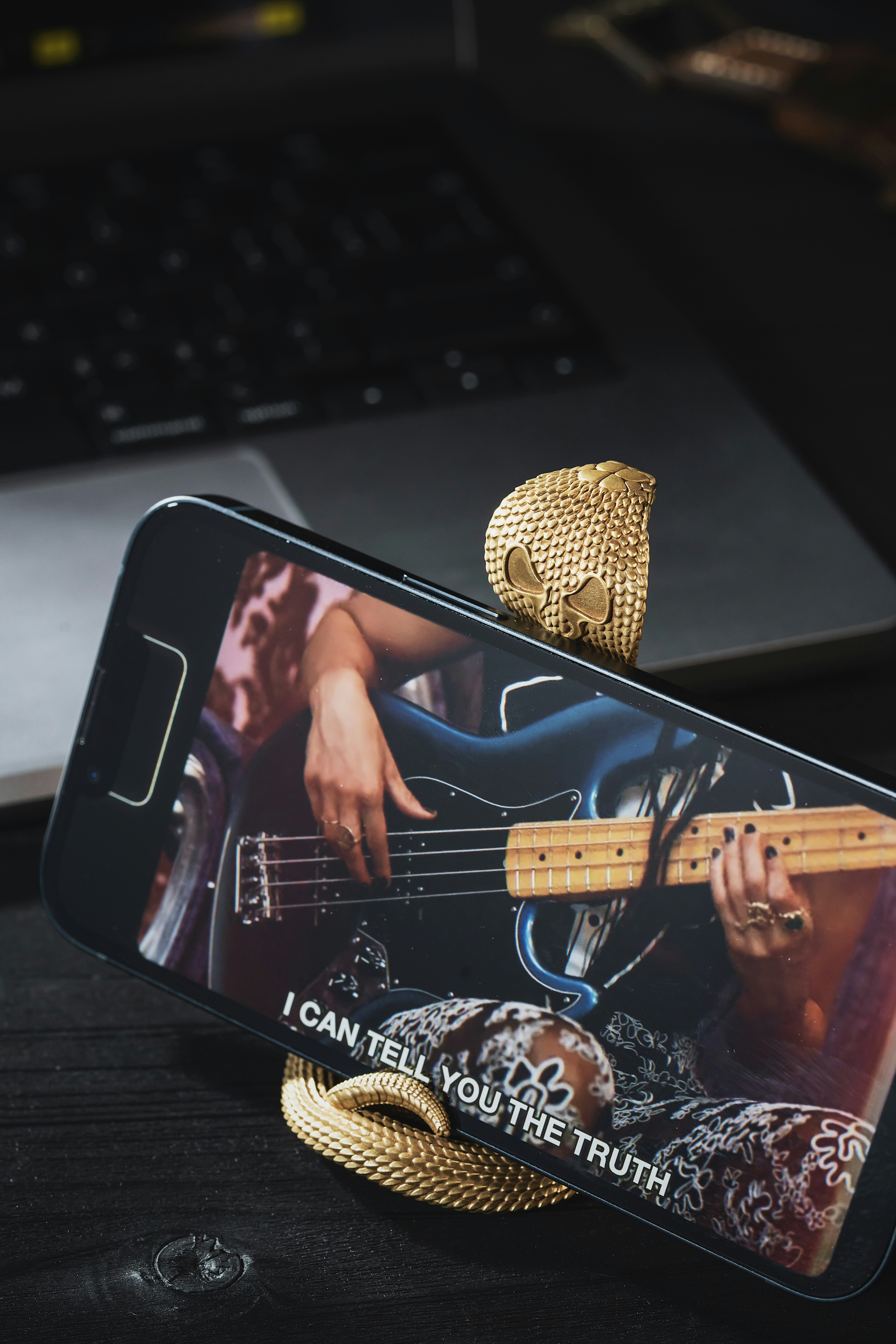 Guitar Strings, Golden Grin: A Phone Screen Concert in Portrait