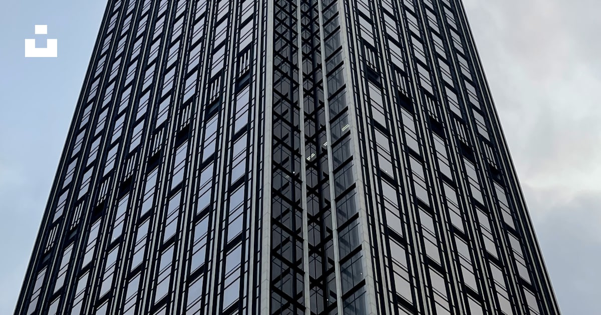 窓がたくさんある非常に高い建物の写真 Unsplashの無料尖沙咀 香港写真