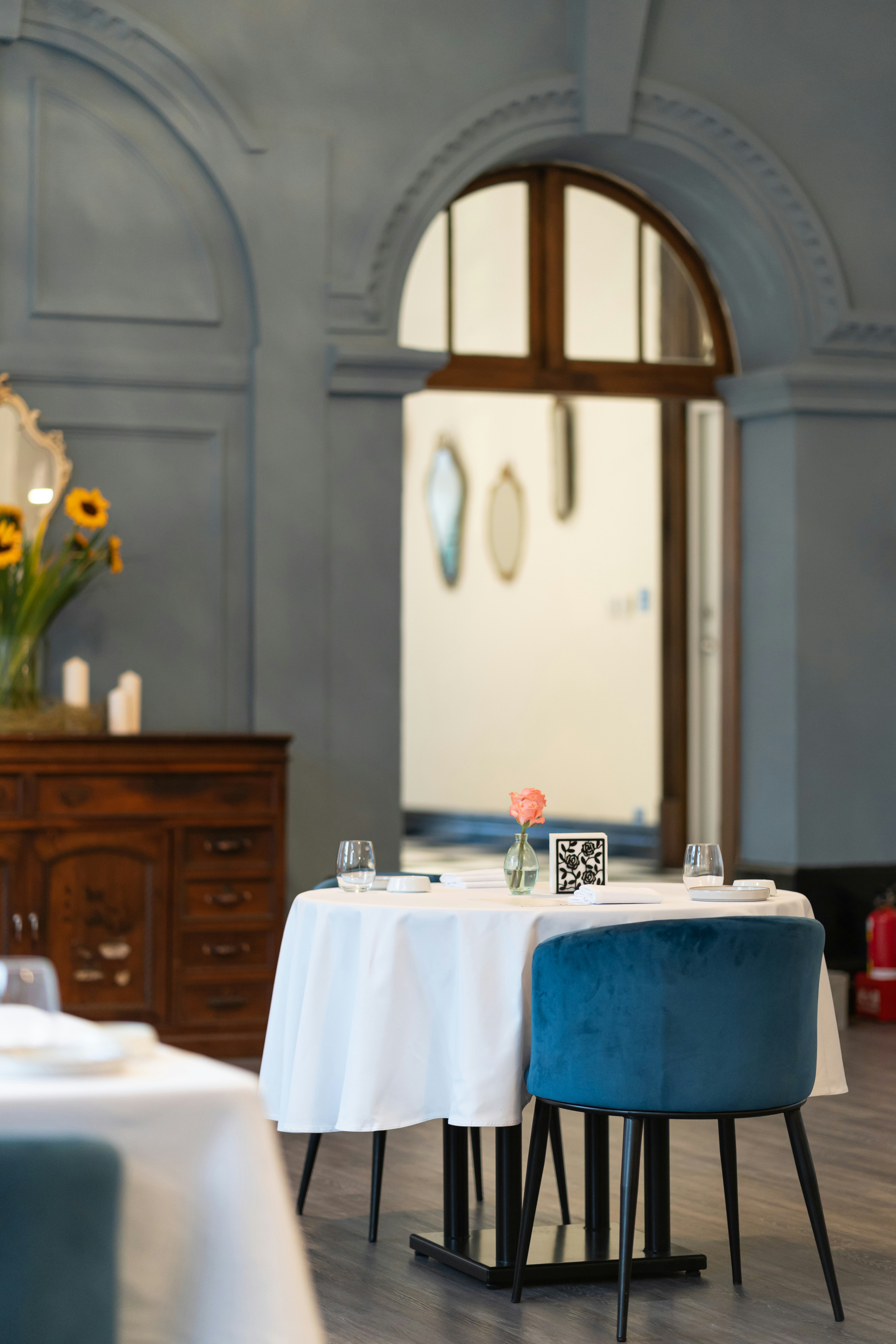 A dining room with a table and two chairs photo – Free Tablecloth Image ...