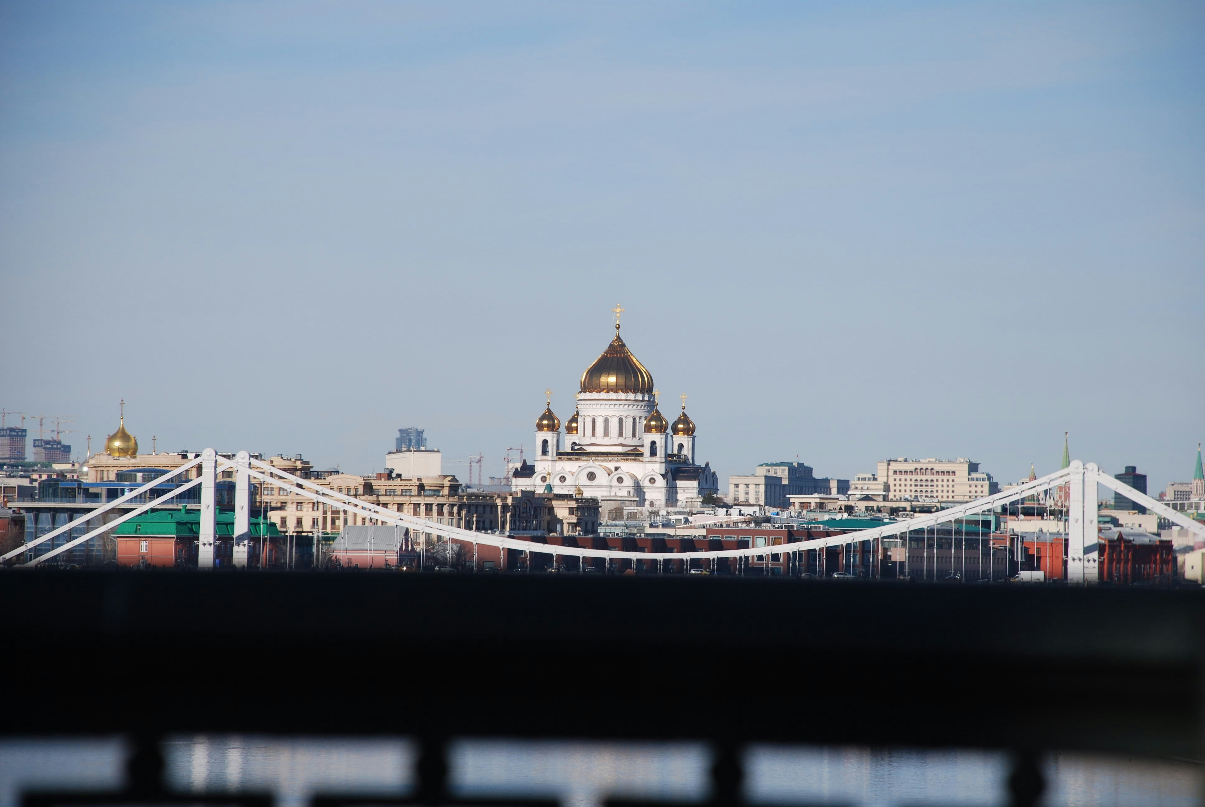 Golden Dome Over the Riverfront: Morning Light on a Suspension-Bridge Skyline