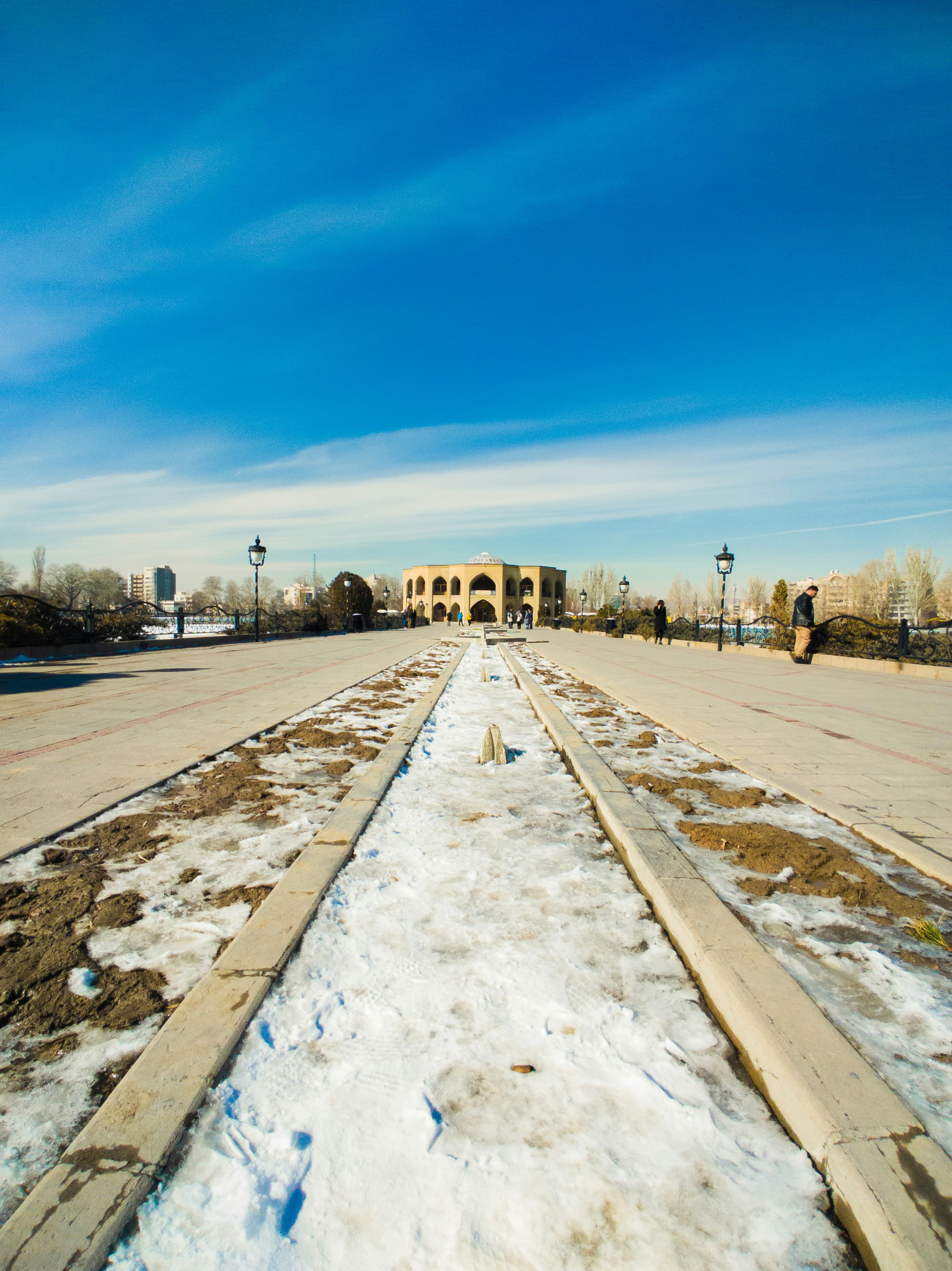 Central Avenue to the Monument: A Winter Corridor Toward the Arch