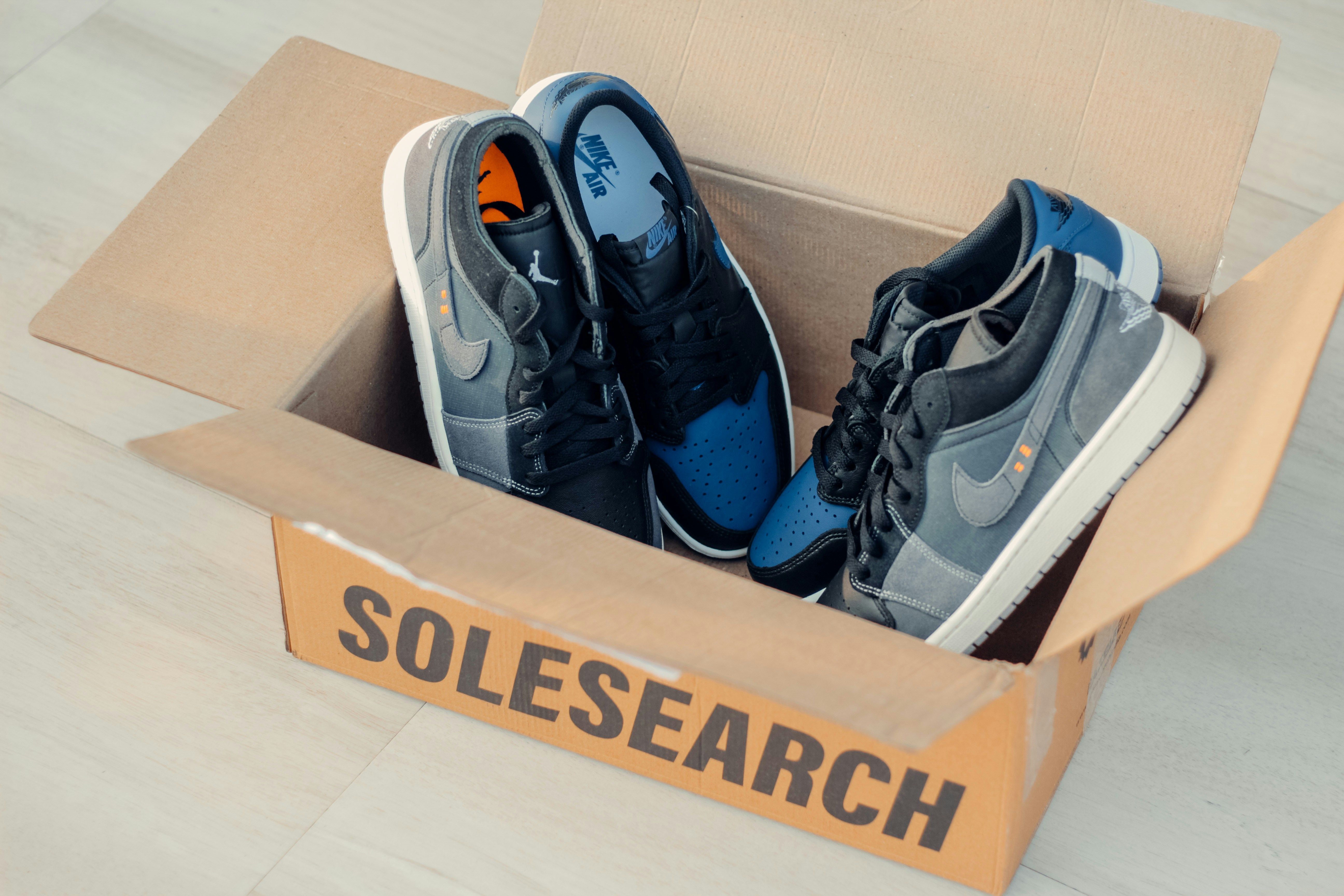 A pair of shoes sitting inside of a shoe box photo – Free Fashion Image ...